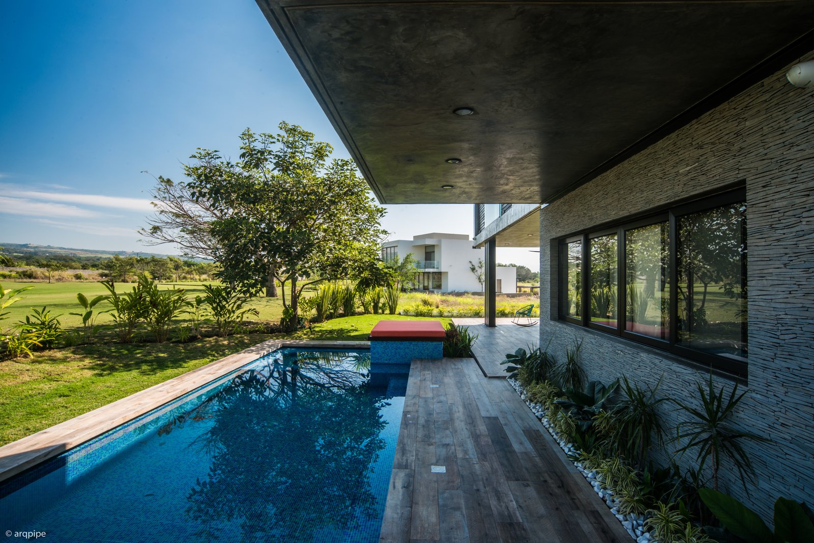 A Home Rocks Out with Natural Stone, Concrete, and a Volcano (6… - Dwell