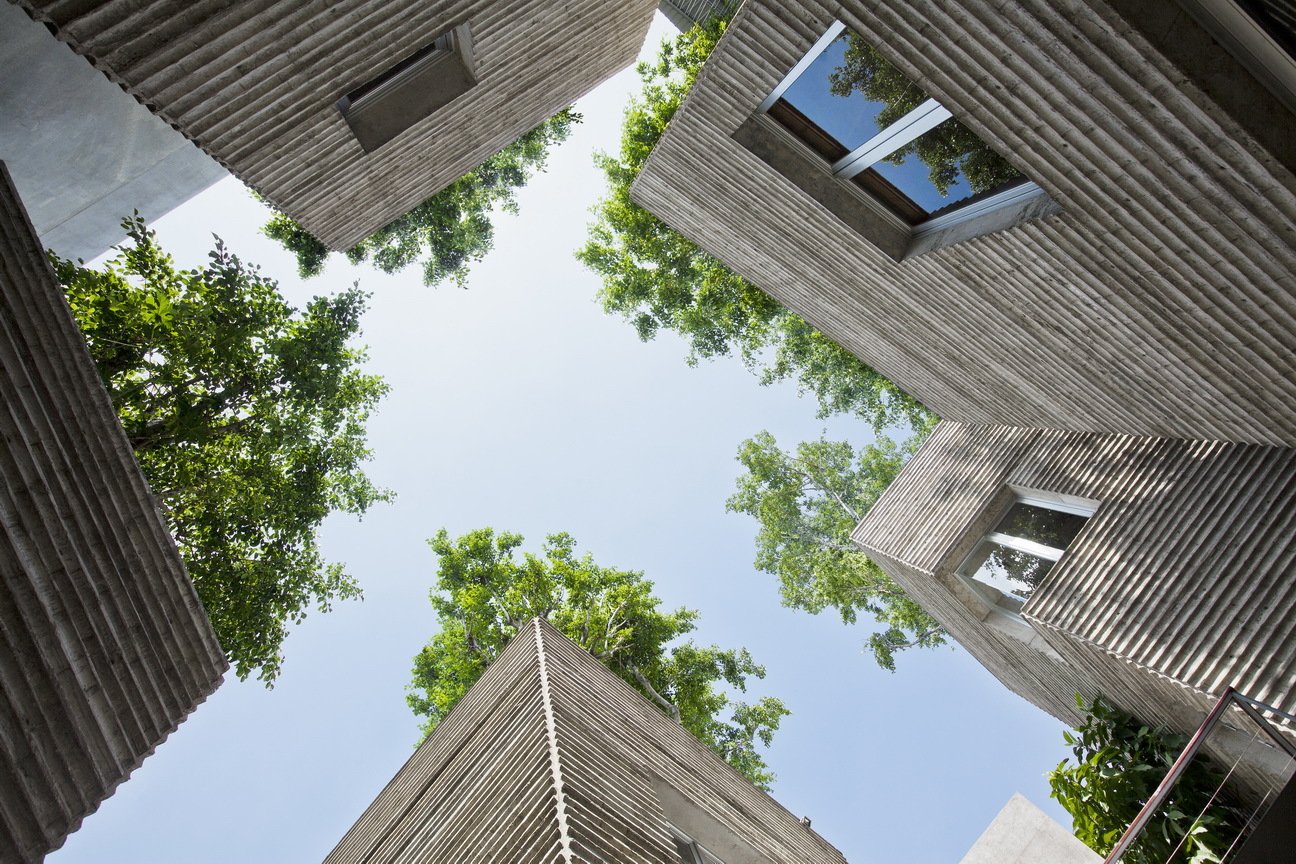 Photo 2 of 20 in A Concrete Home in Vietnam Is Topped With Trees - Dwell