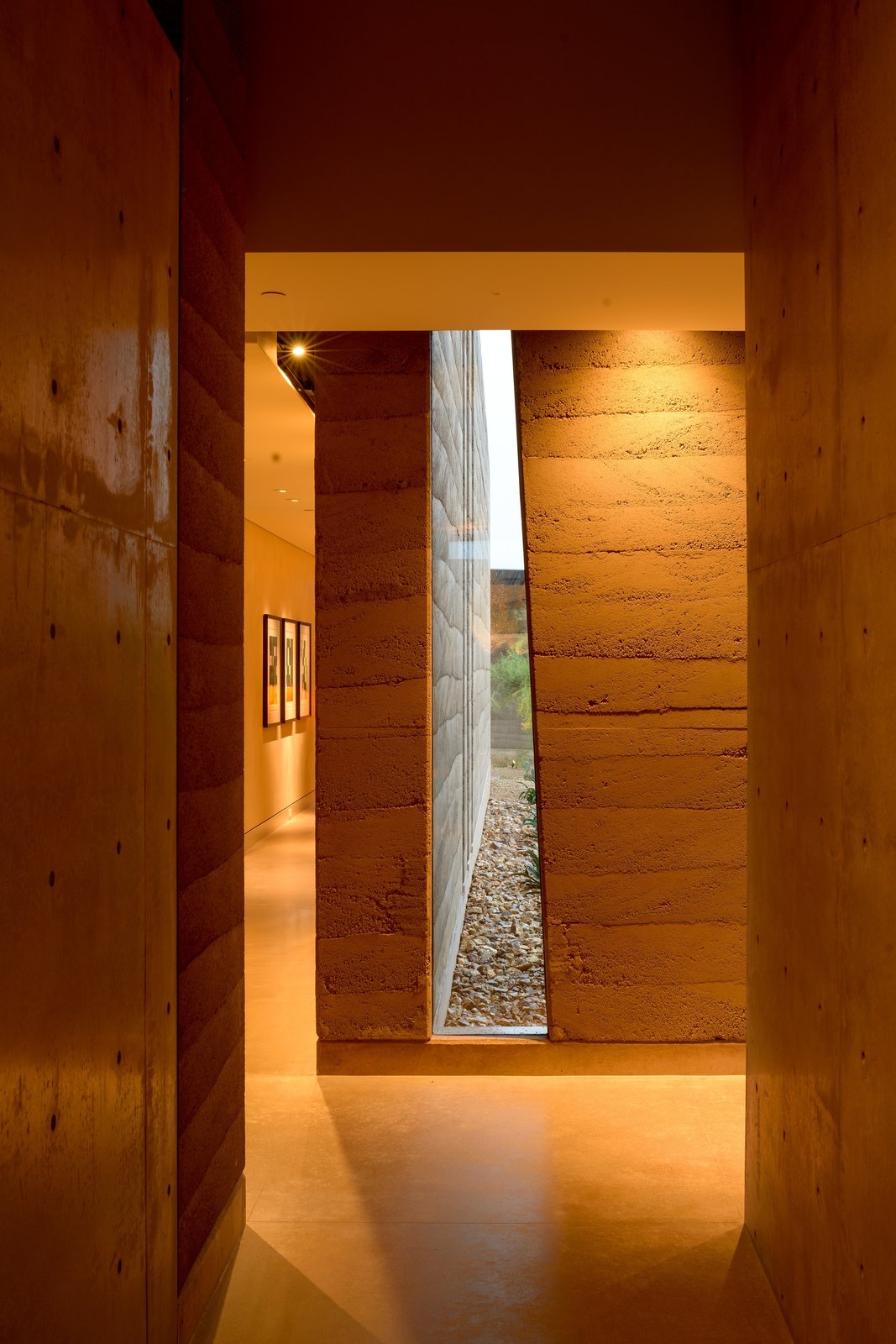 Photo 11 of 14 in A Dramatic Floating Roof Crowns This Rammed Earth ...