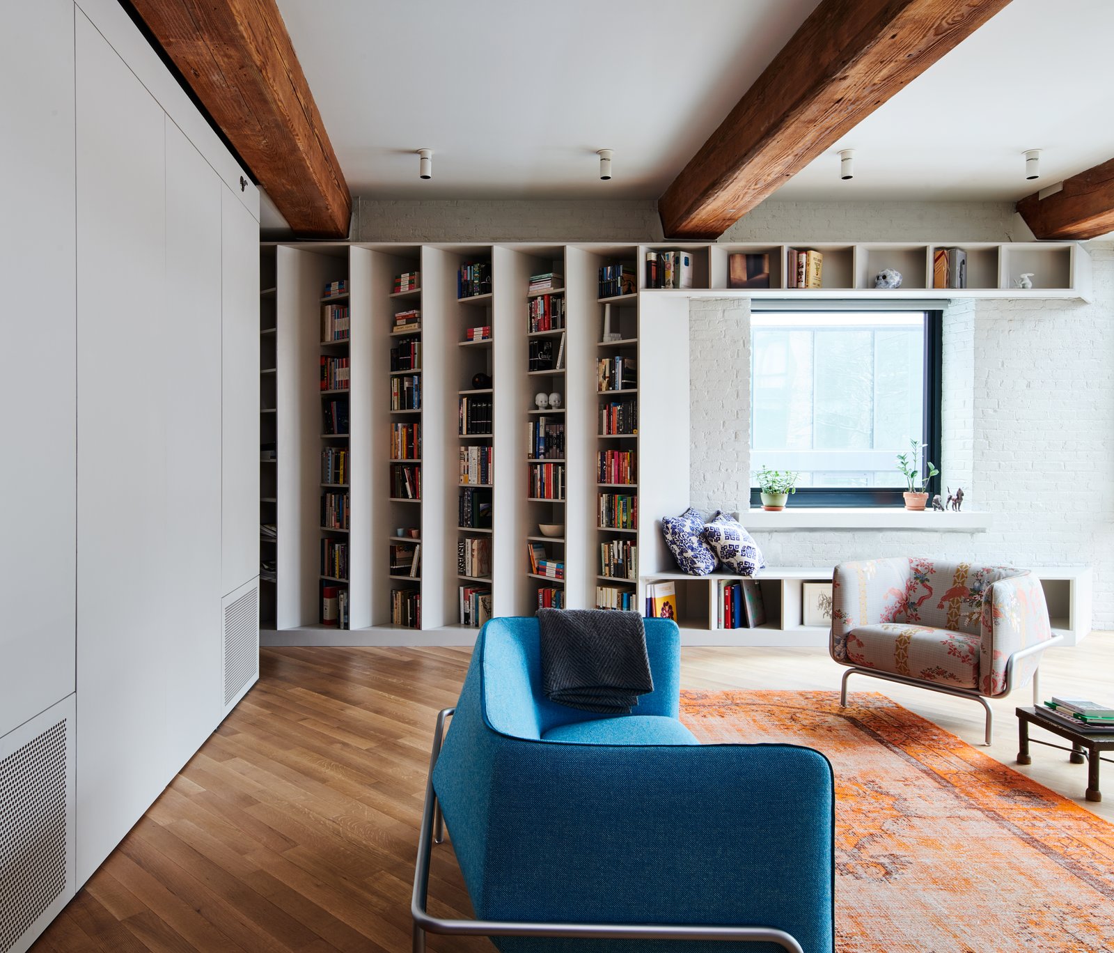 Photo 2 of 7 in This Brooklyn Loft Keeps 2,500 Books Tidy With Angled ...