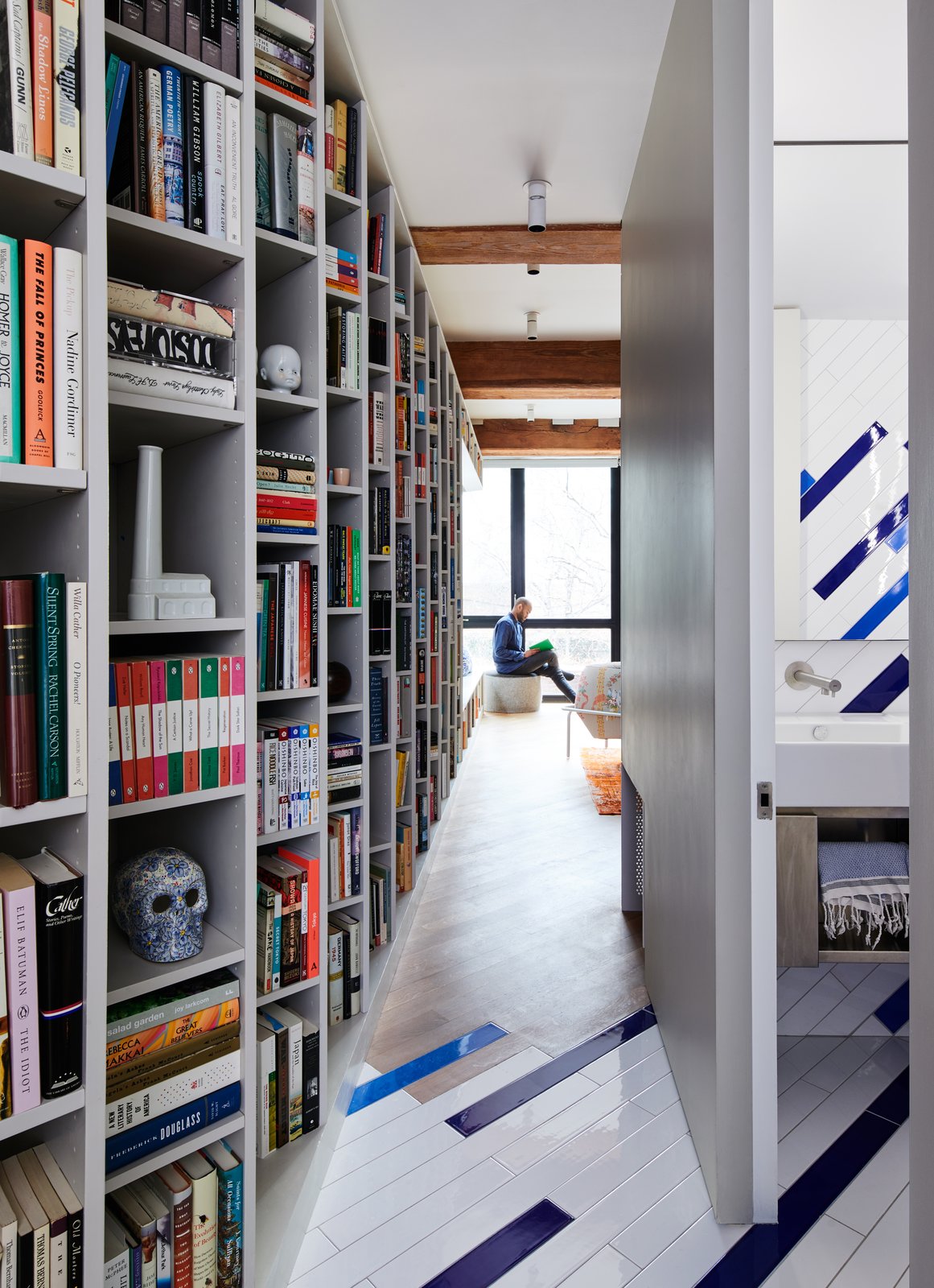 Photo 3 of 7 in This Brooklyn Loft Keeps 2,500 Books Tidy With Angled ...