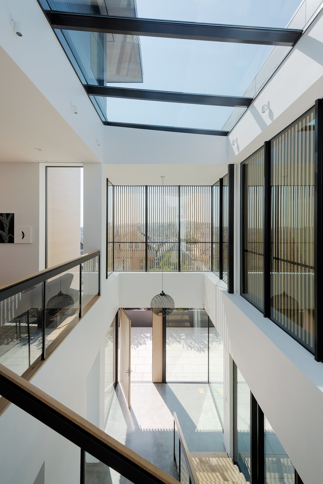 Photo 3 of 8 in This Home’s Glazed Facade Embraces Natural Light and ...