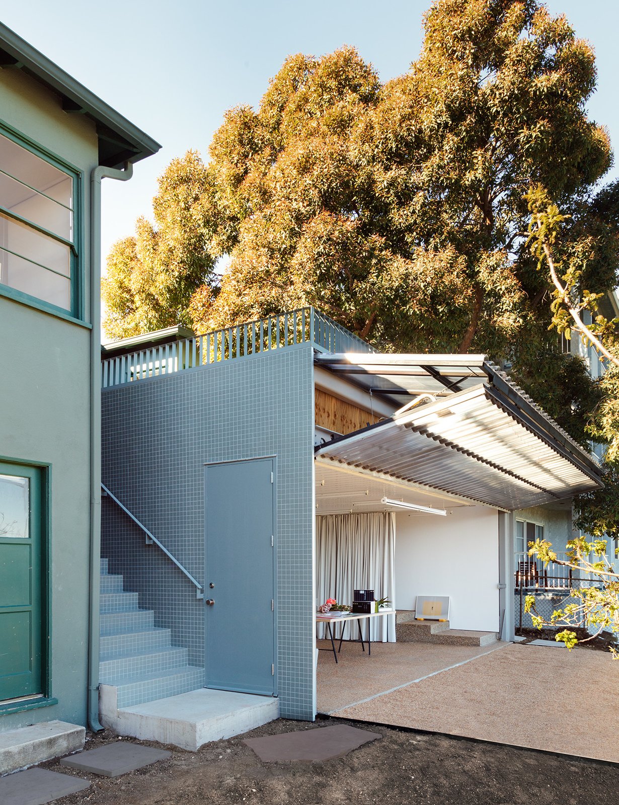 Photo 1 of 8 in A Corrugated, Plastic Bifold Door Opens Up an Artist’s ...