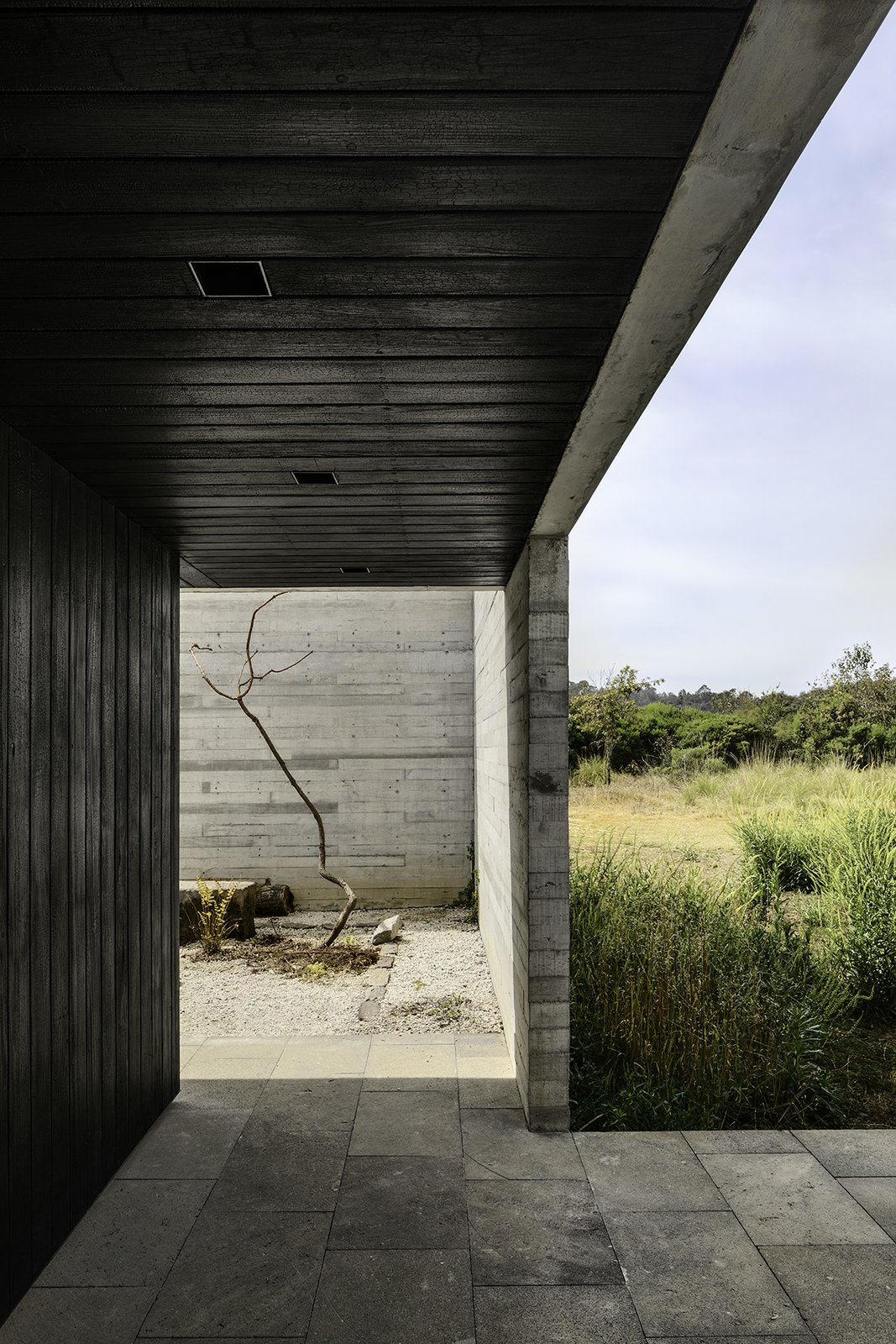 Photo 11 of 14 in A Monolithic, Concrete Home Commands the Landscape ...