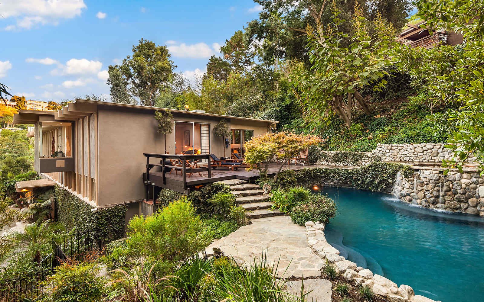 Photo 11 of 12 in A Lagoon-Style Pool Surrounds This Hollywood Hills ...