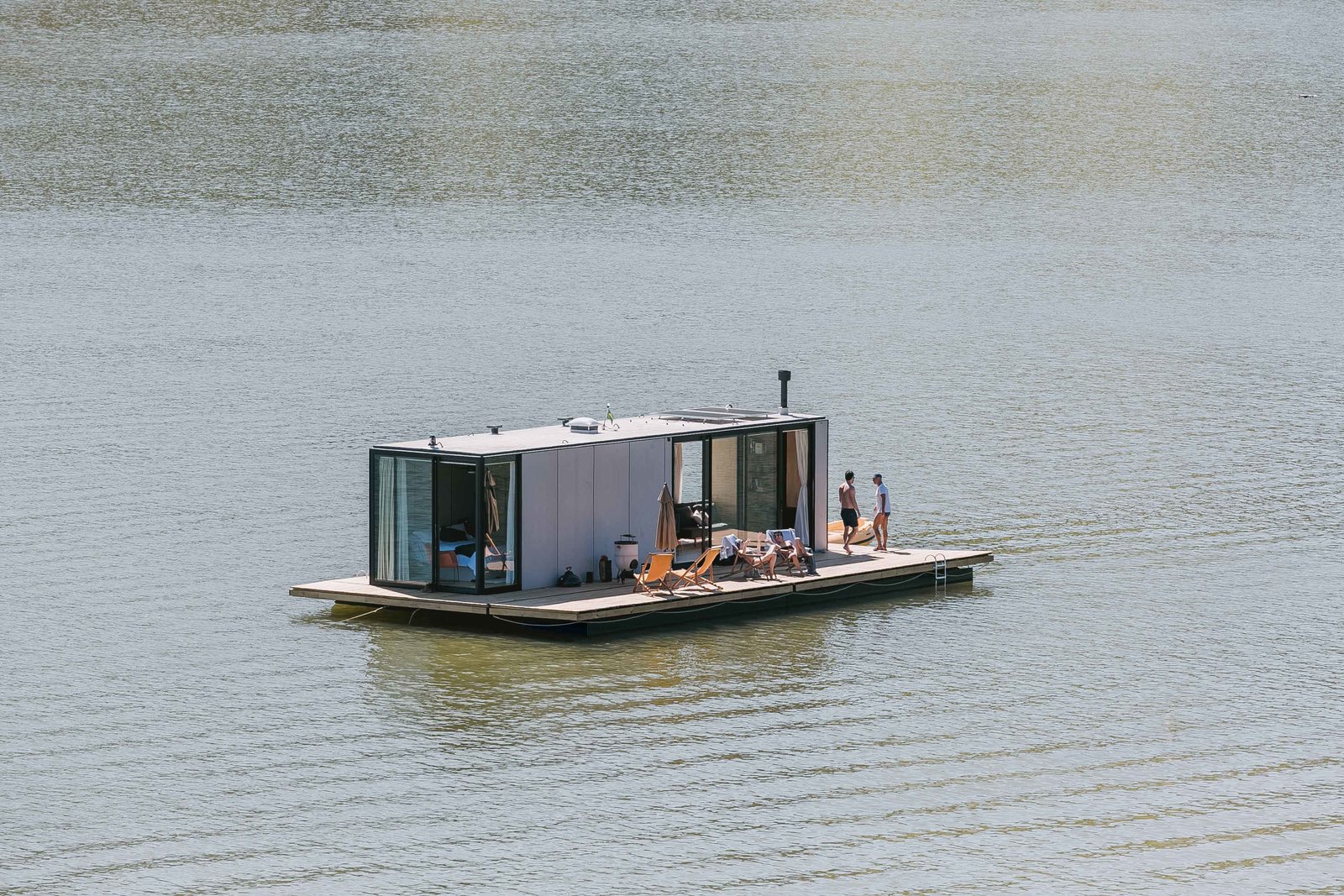 Photo 1 of 10 in This Floating, Off-Grid Prefab Can Be Assembled in ...