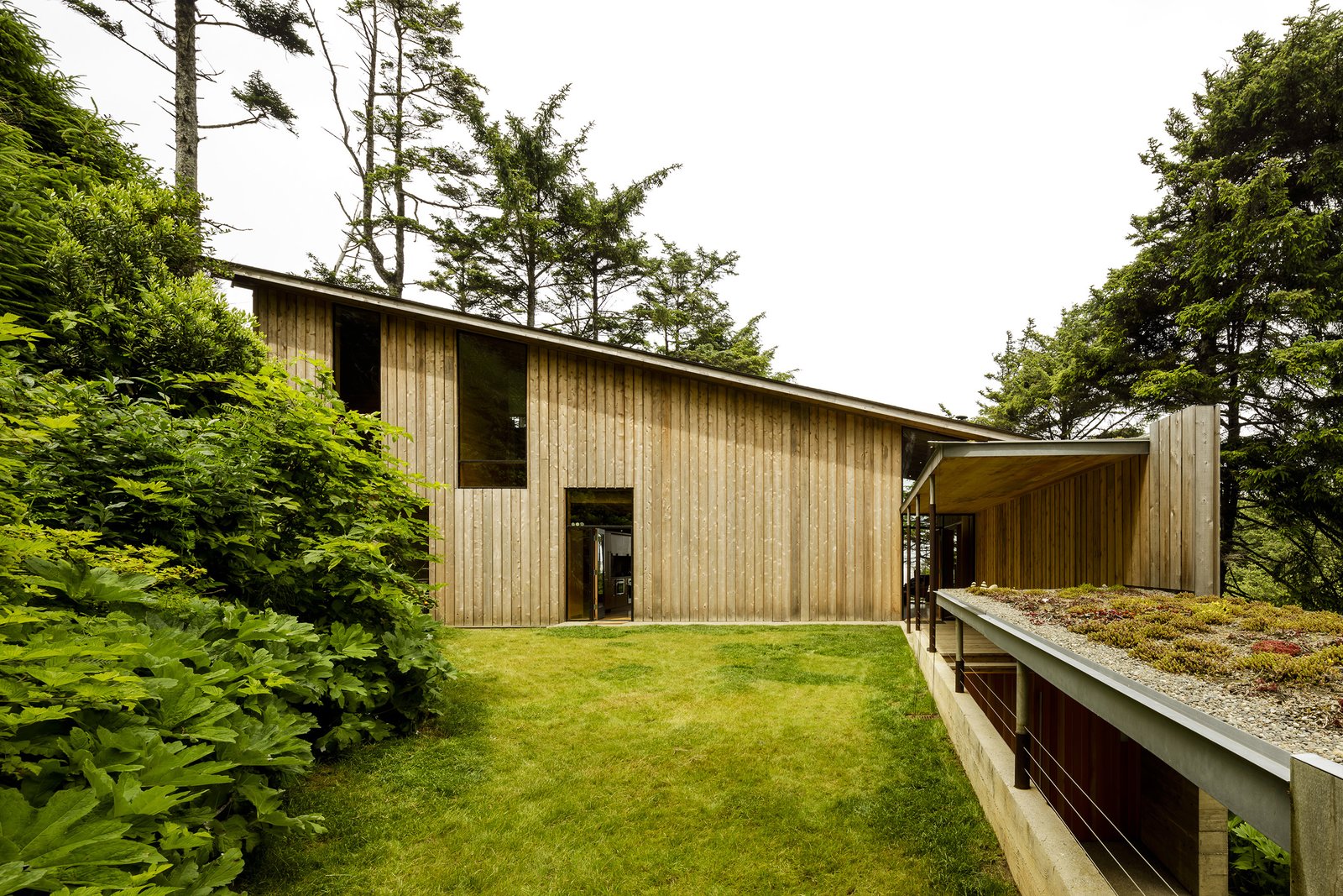 Photo 2 of 14 in A Rustic Hideaway Perches on a Wooded Bluff ...