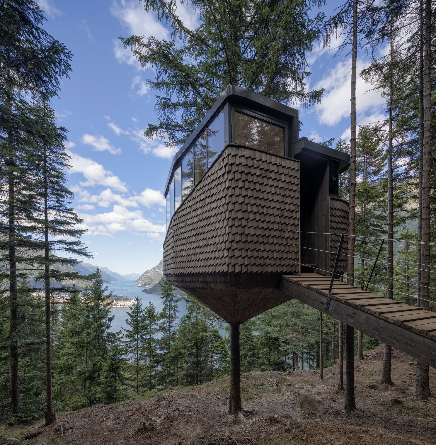 Photo 2 of 20 in A Pair of Pine Cone–Shaped Tree Houses Overlook a ...