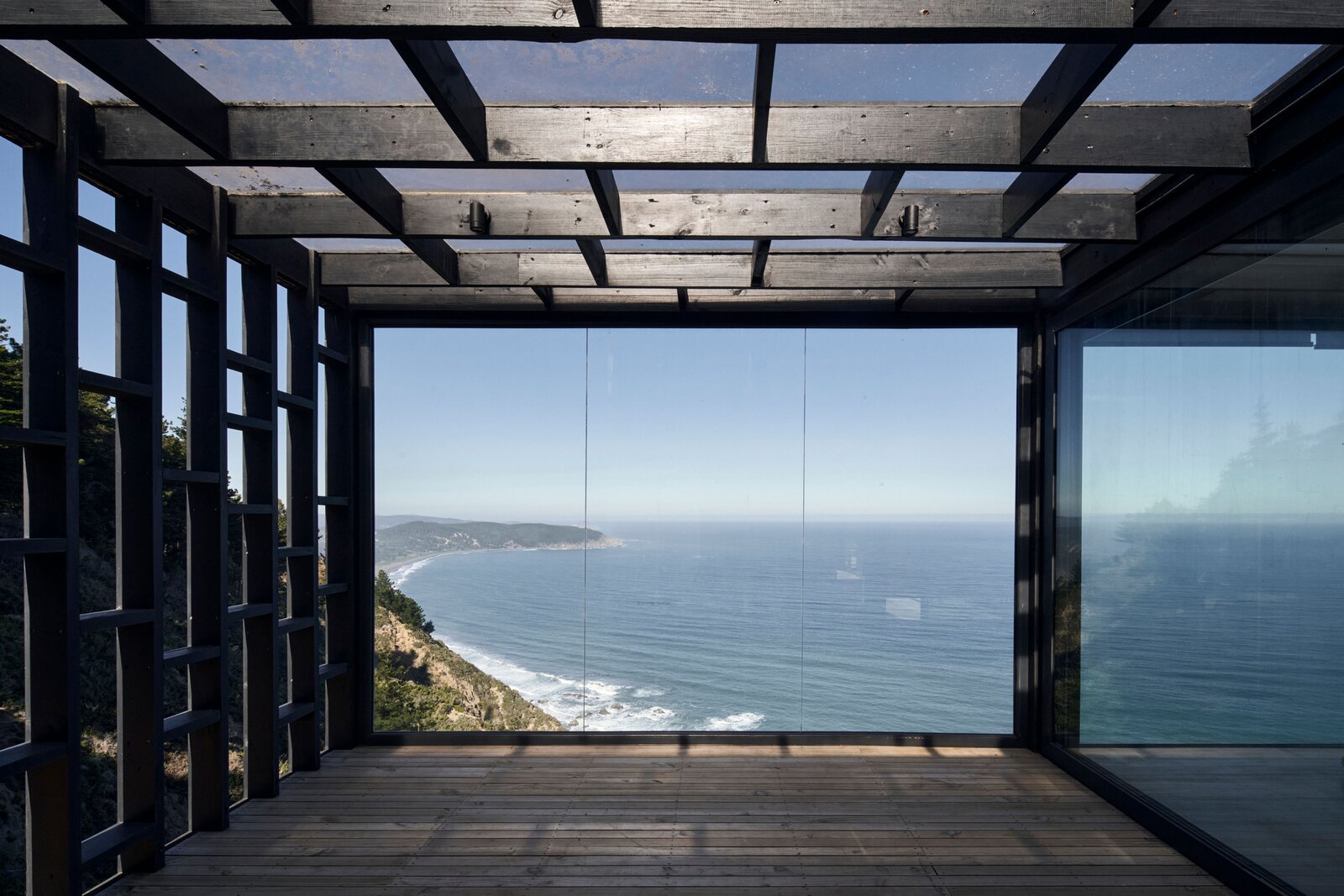 Photo 4 of 11 in A Surfer Couple Build an All-Black Off-Grid Cabin on a ...