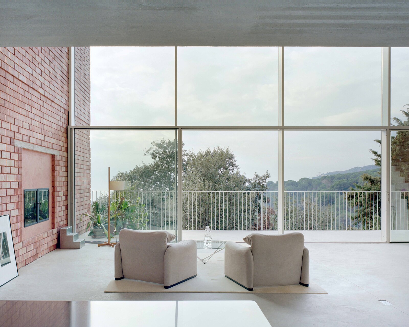 Photos from An Architect Perches His Brick-Forward Family Home High on ...