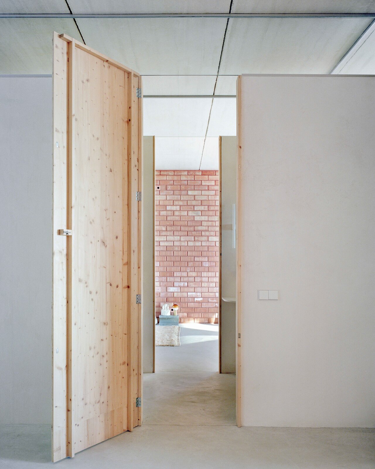 Photo 8 of 12 in An Architect Perches His Brick-Forward Family Home ...