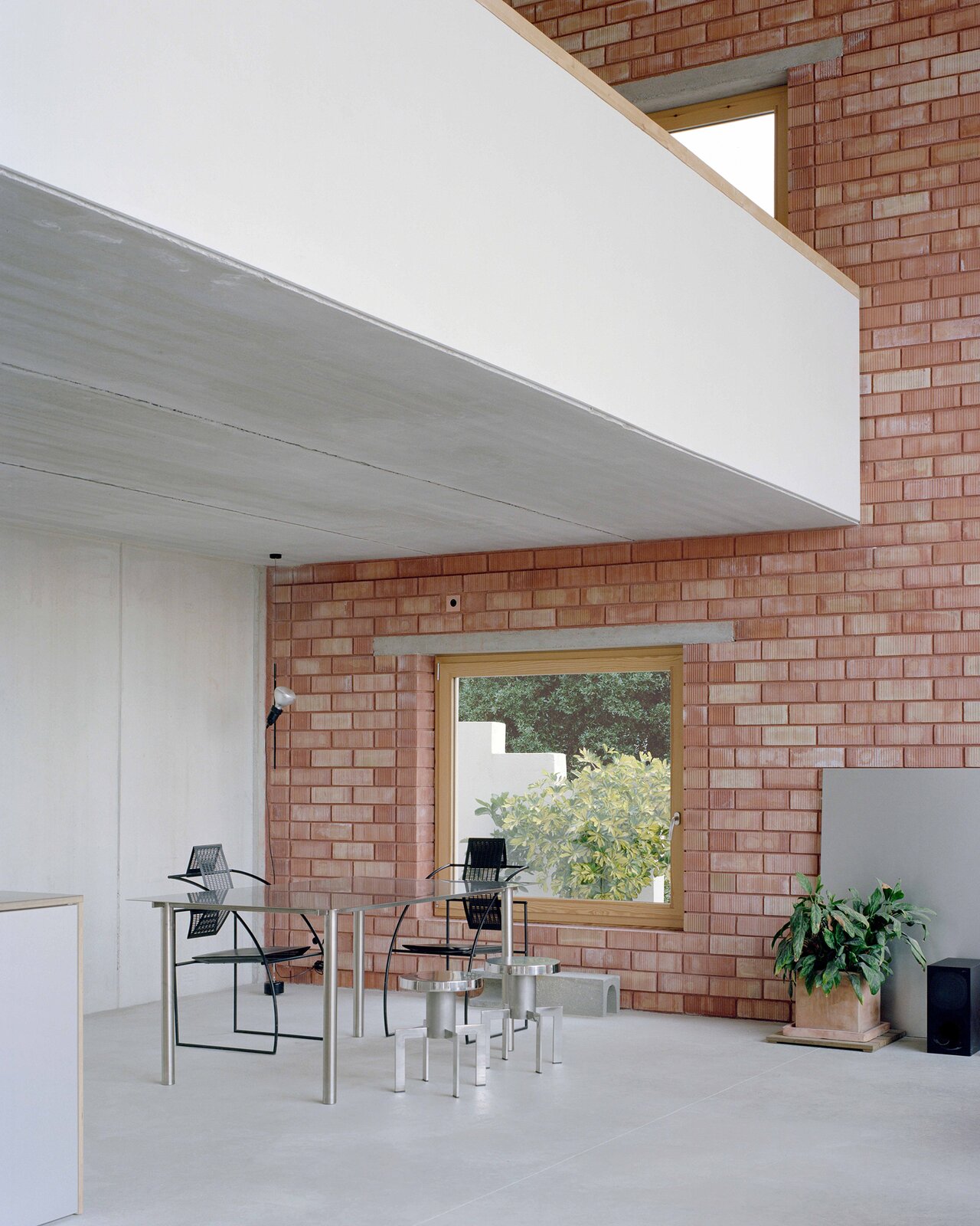 Photo 10 of 12 in An Architect Perches His Brick-Forward Family Home ...