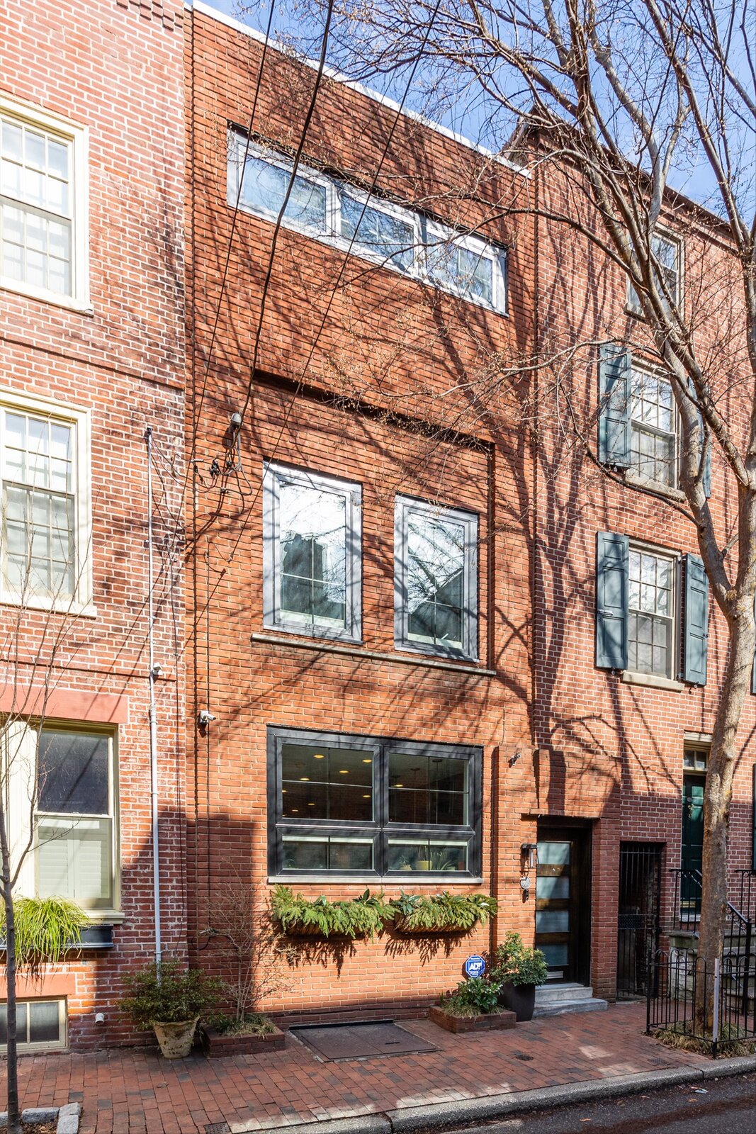 Photo 1 of 10 in A Charming Brick Townhouse With a Spiral Staircase ...