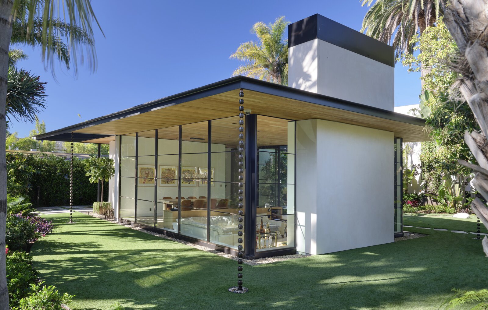 Photo 5 of 16 in A Secret Garden Springs to Life Around a Glassy Olson ...