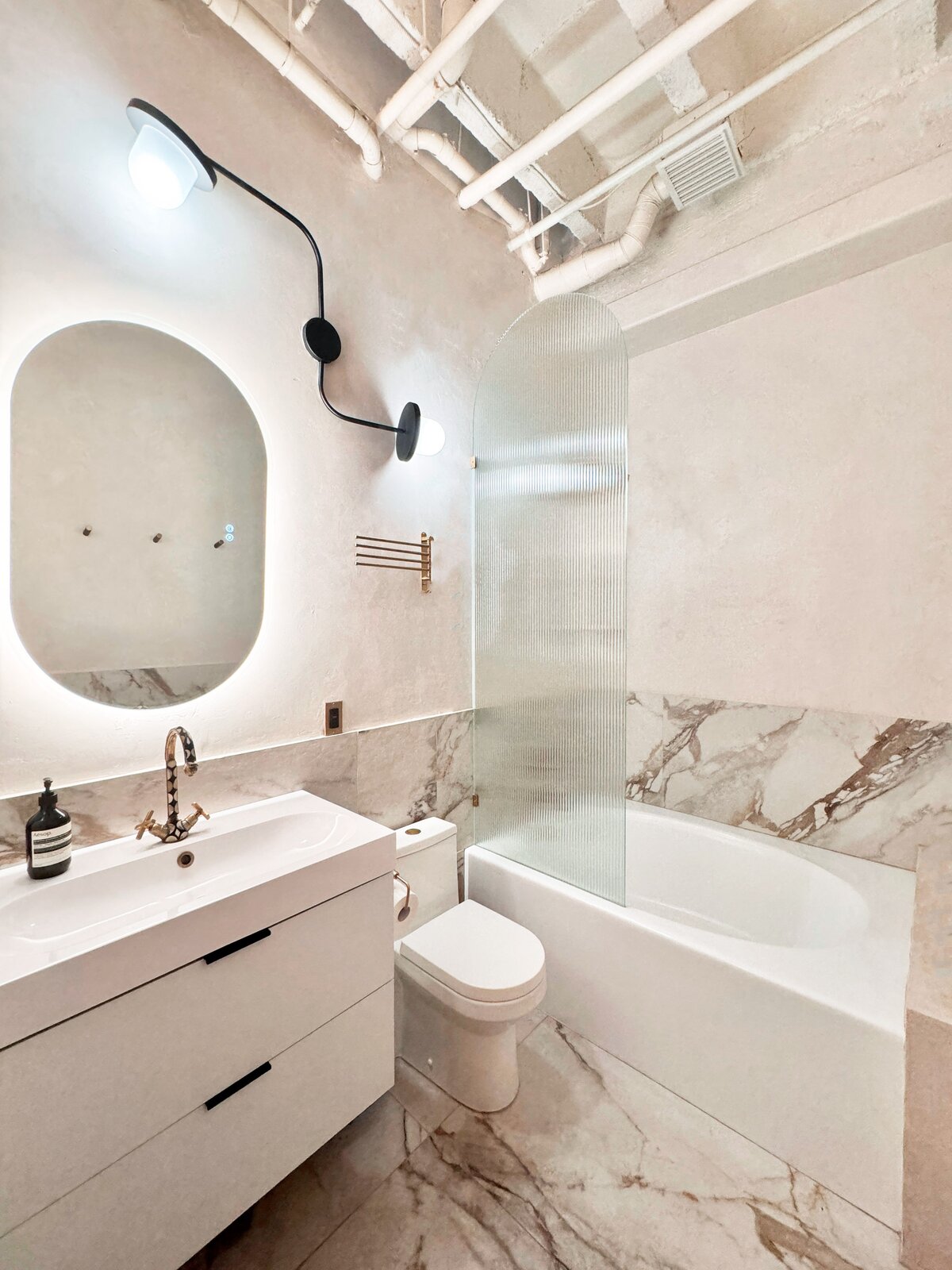 Photo 4 of 4 in I DIYed My Condo Bathroom Reno for Just $3,000 - Dwell