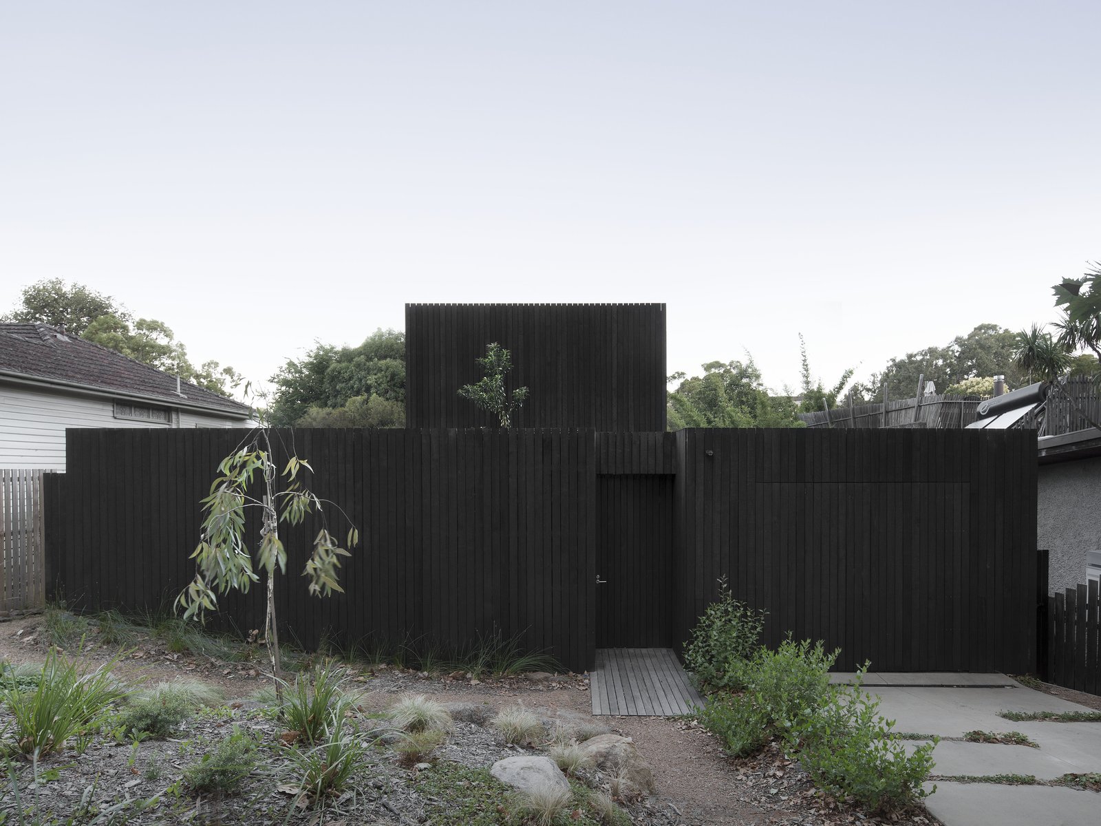 Photo 1 of 7 in There’s a Jungle Inside This Blackened Timber Home in ...