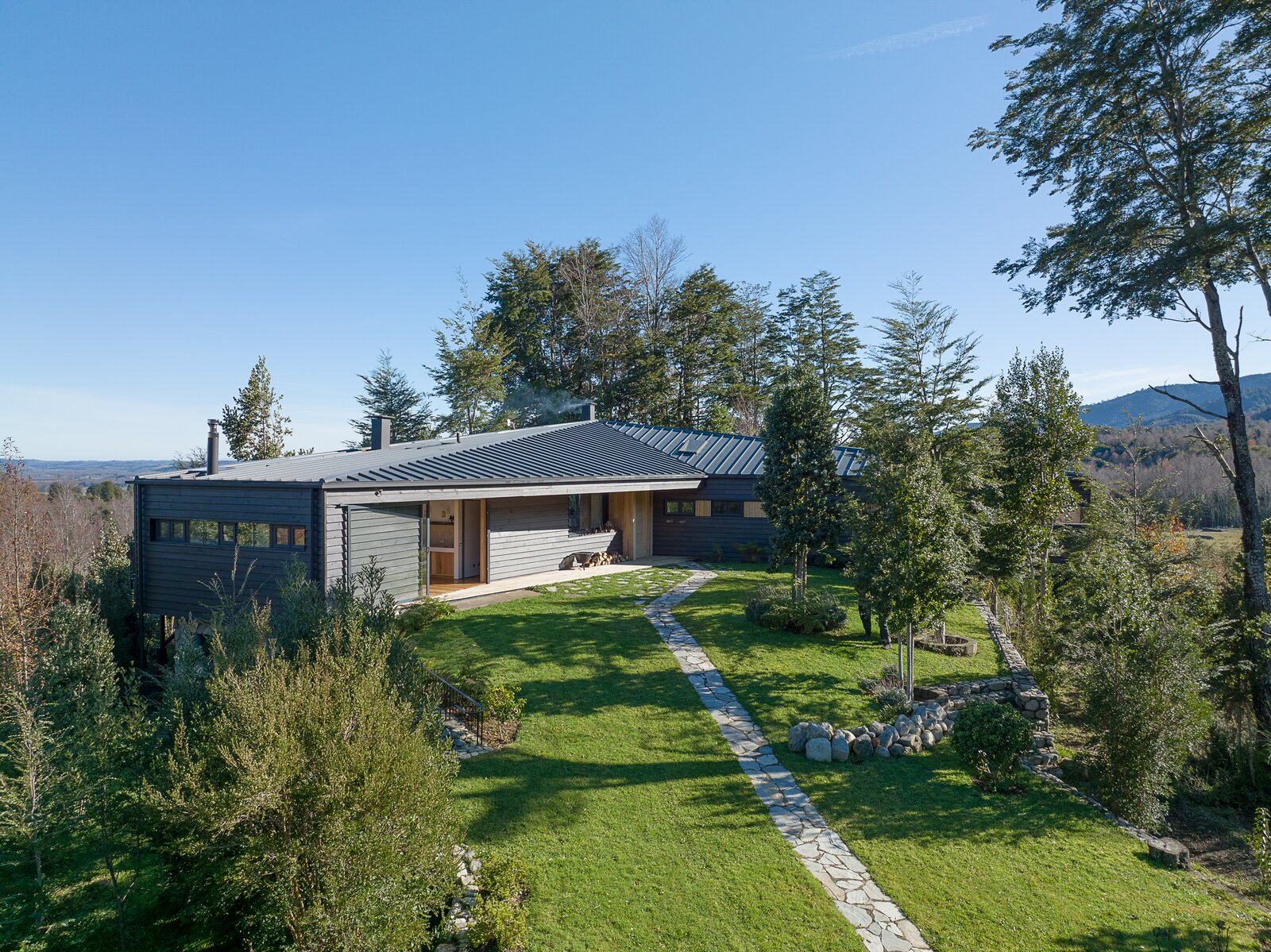 Photo 4 of 17 in A T-Shaped Cabin Hugs a Forested Hillside in Chile - Dwell