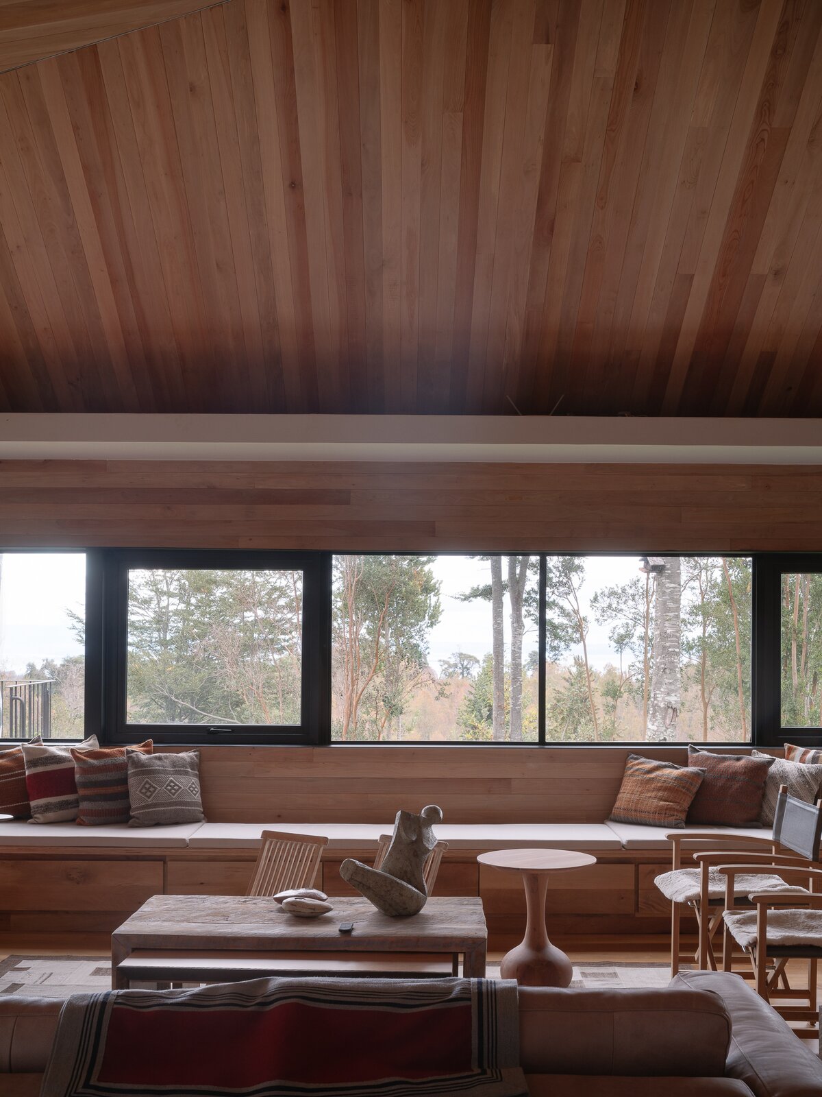Photo 12 of 17 in A T-Shaped Cabin Hugs a Forested Hillside in Chile ...