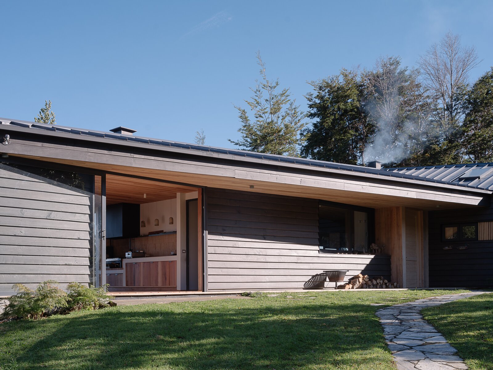 Photo 9 of 17 in A T-Shaped Cabin Hugs a Forested Hillside in Chile - Dwell