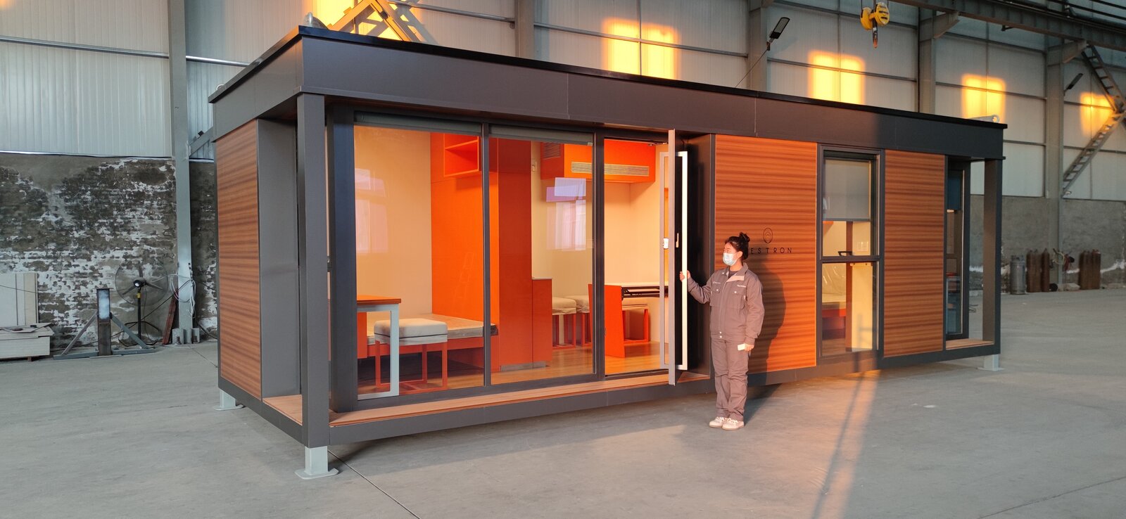 Photo 1 of 6 in This Wood-Wrapped Prefab With Built-In Furniture Starts ...