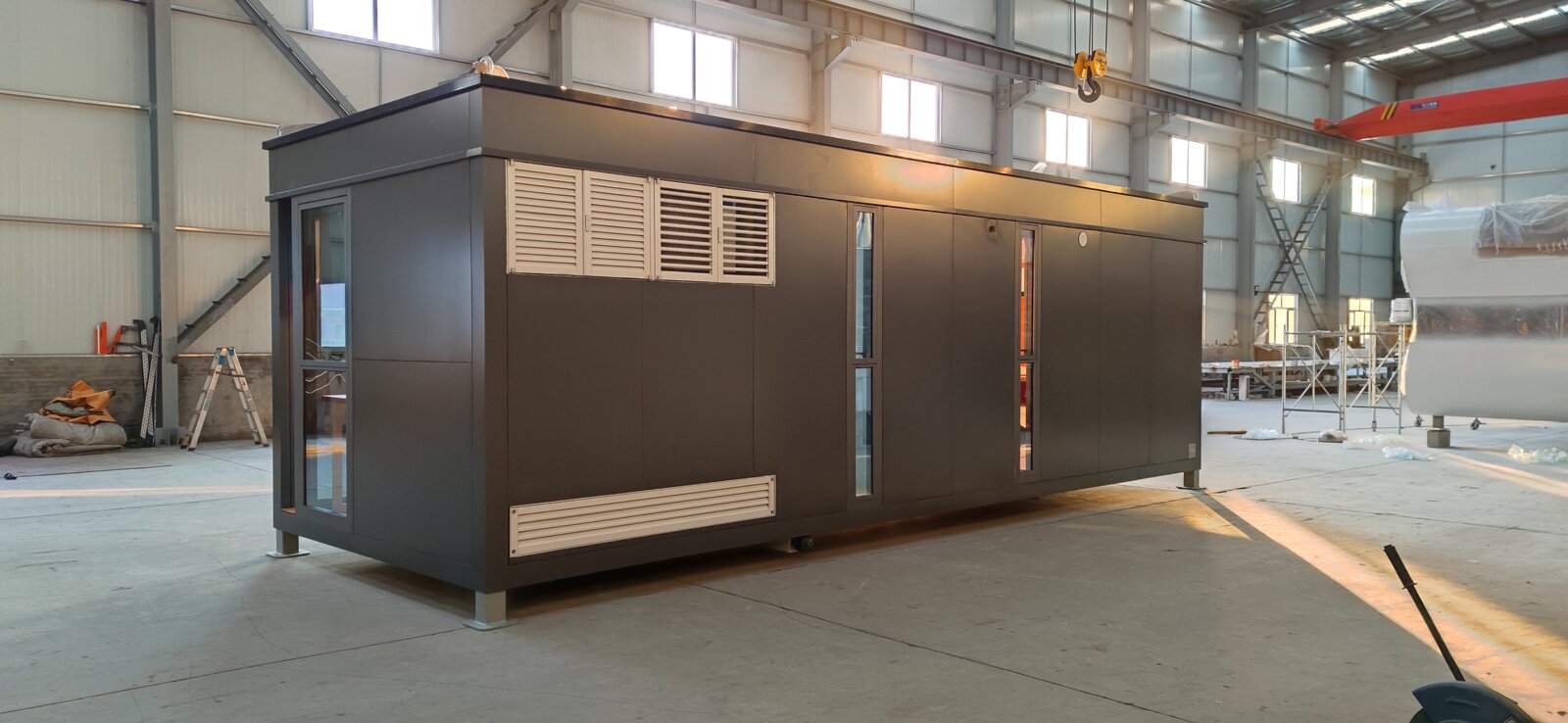 Photo 3 of 6 in This Wood-Wrapped Prefab With Built-In Furniture Starts ...