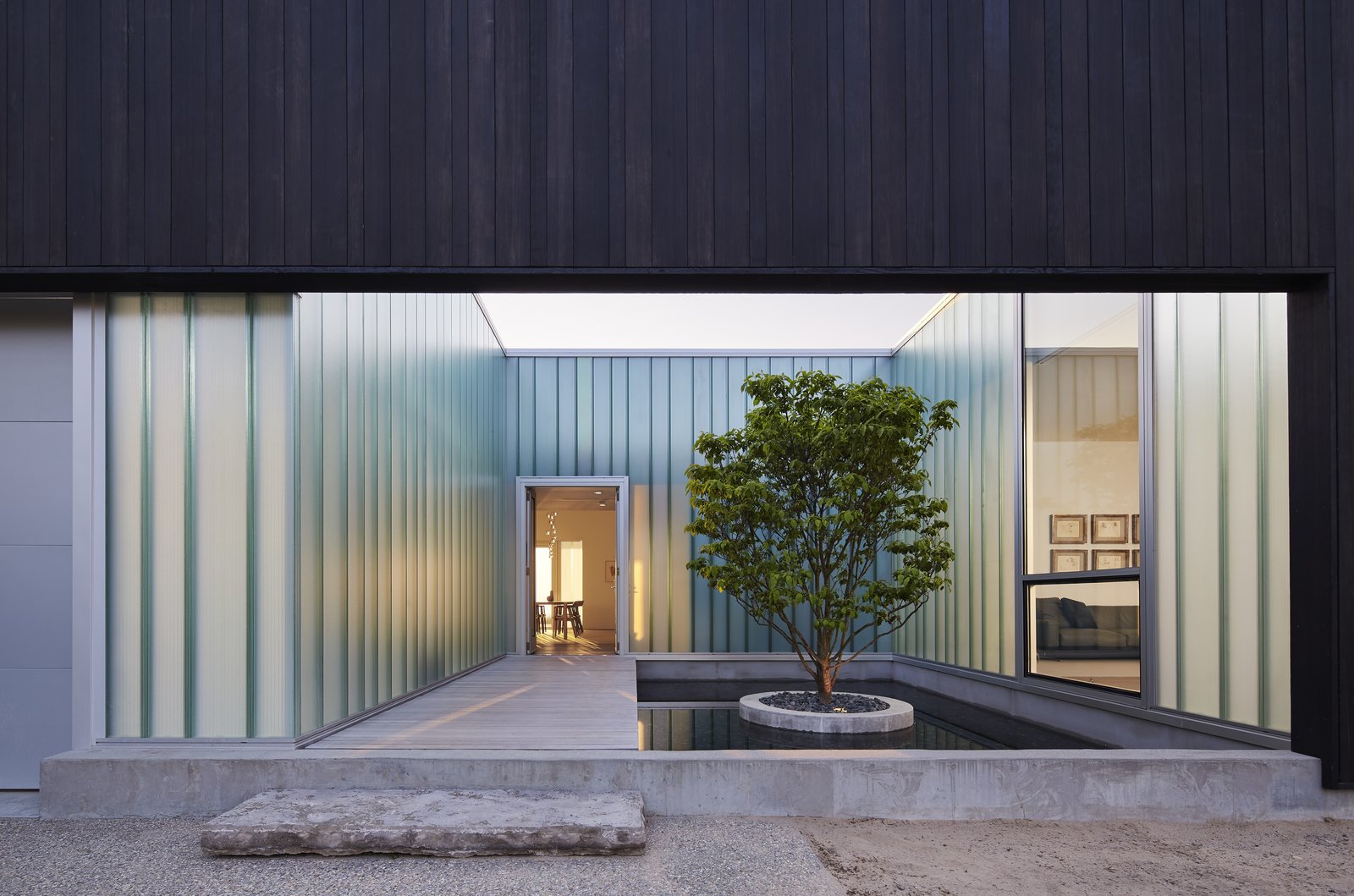 Photo 3 of 12 in Four Courtyards Form This Modern Waterfront Home - Dwell