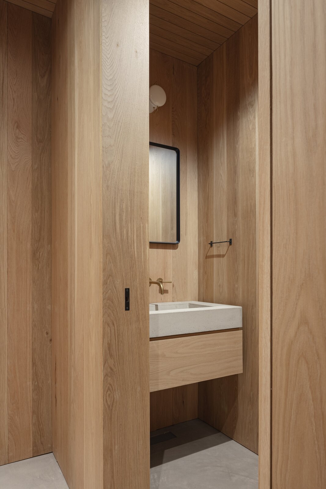 Photo 11 of 13 in A Black Gable Cantilevers Over the Entrance to This ...