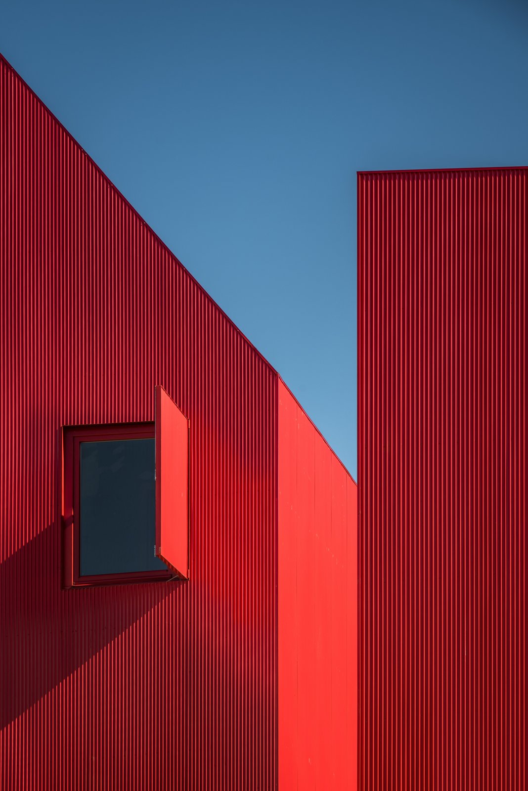 Photo 6 of 15 in A Fiery-Red Home Sizzles With Simplistic, Modern ...