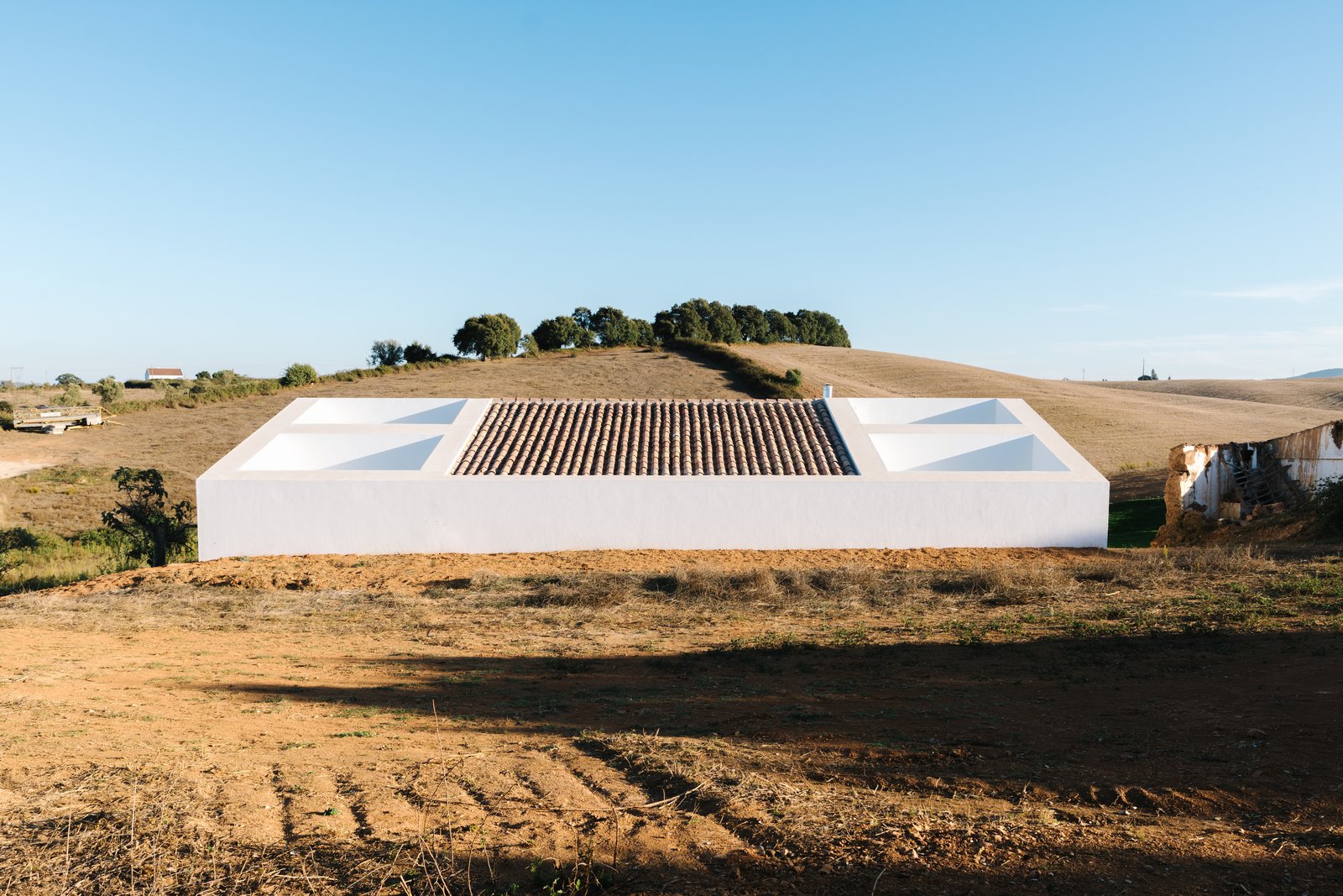 Photo 2 of 16 in Roof Cut-Outs in This Portuguese Home Draw in Light ...