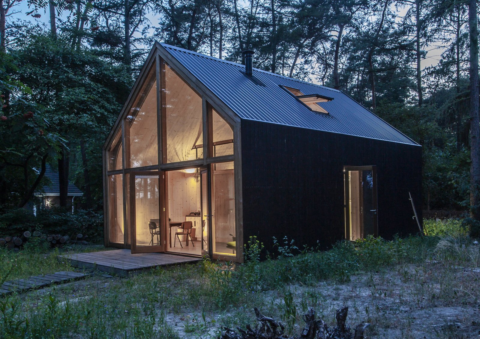 Photo 2 of 11 in A Dutch Sculptor’s Prefab Cabin Has Curved Pinewood ...