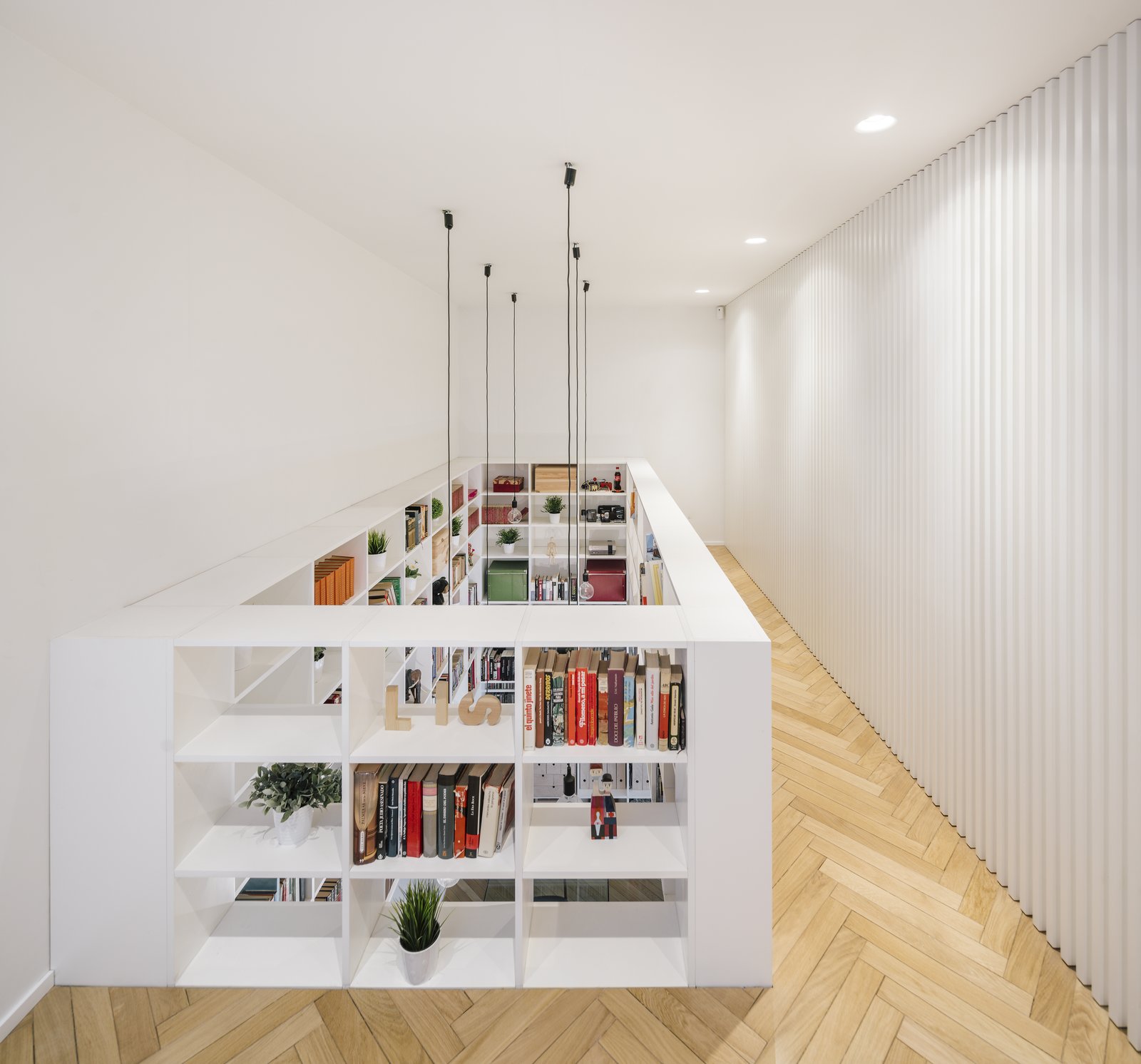Photo 5 of 9 in An Ingenious, Multistory Bookshelf Organizes a Sleek ...