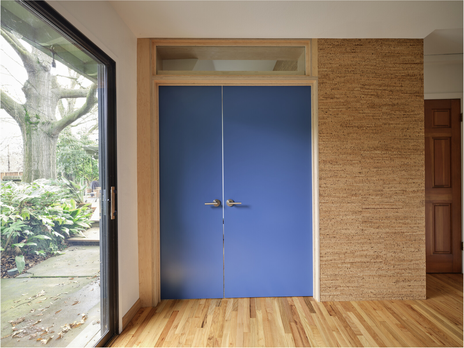 Photo 3 of 10 in How They Pulled It Off: A Triple-Leaf Door Creates ...