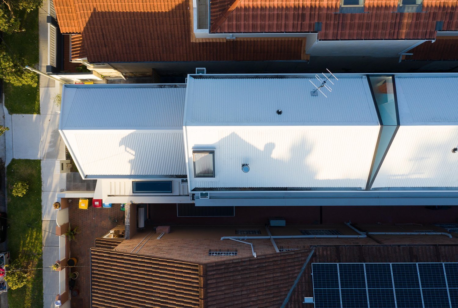 Photo 1 of 10 in The Site Was Long and Narrow, so They Cut the Home in ...