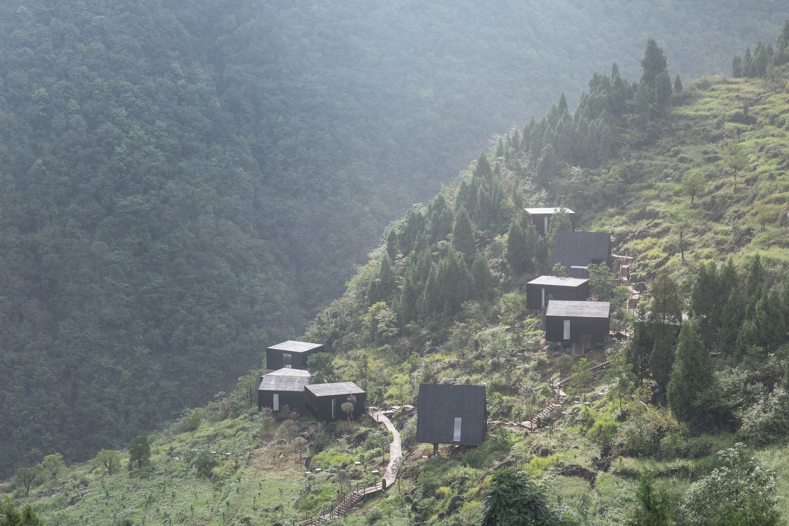 Photo 2 of 8 in These Geometric Cabins in China Seem to Float Over a ...