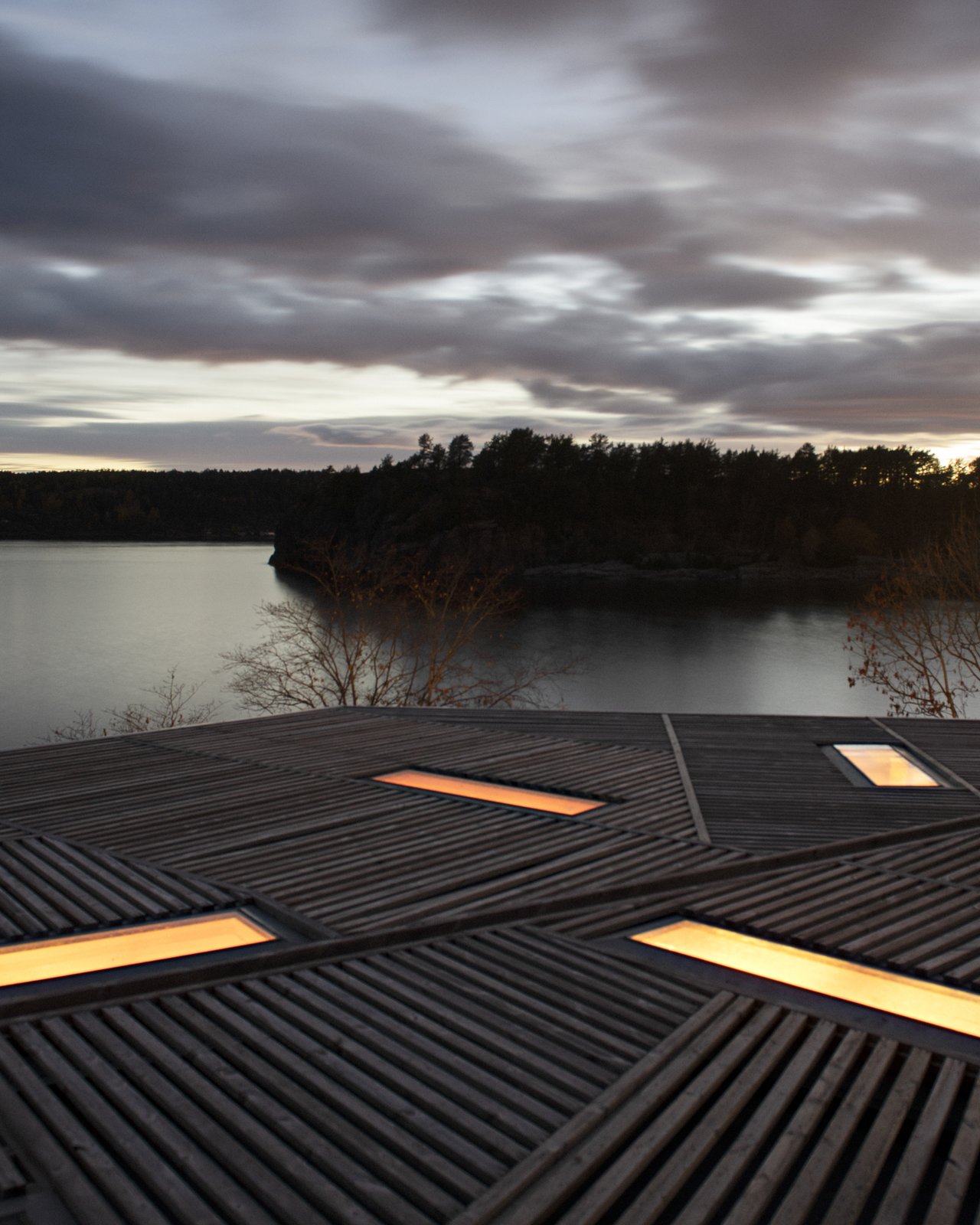 Photo 8 of 9 in A Wood Screen Wraps an Island Retreat for Two Artists ...
