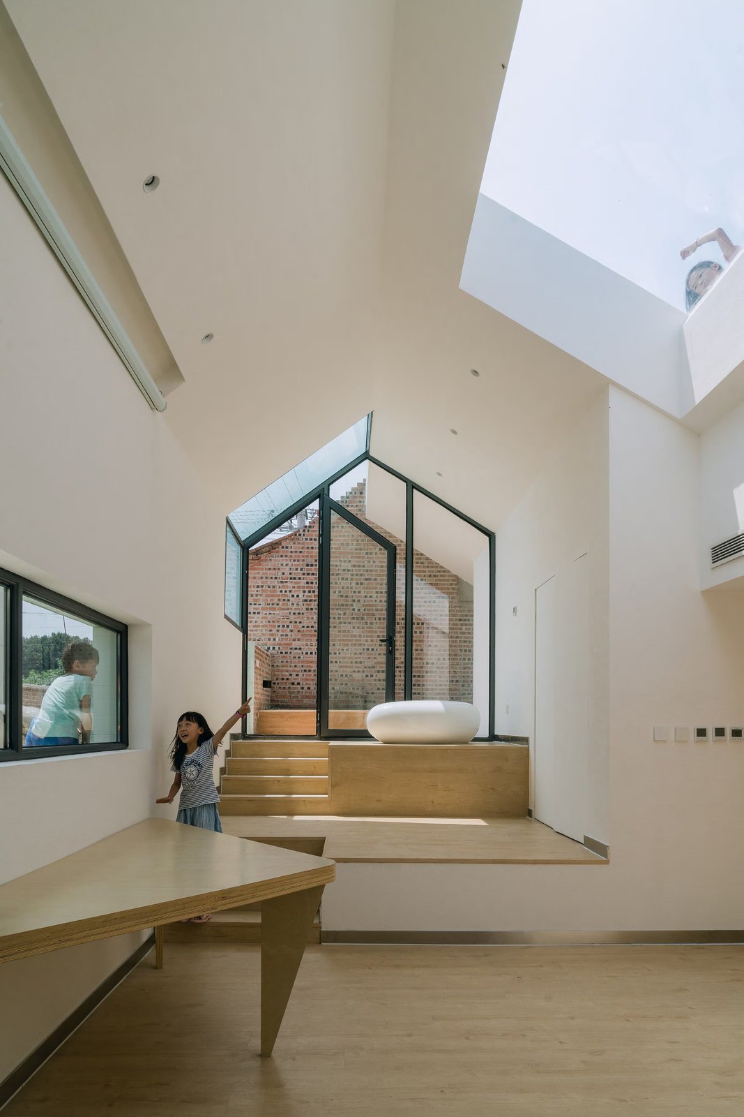 Photo 6 of 13 in A Mint-Green Addition Freshens Up a Brick House in ...