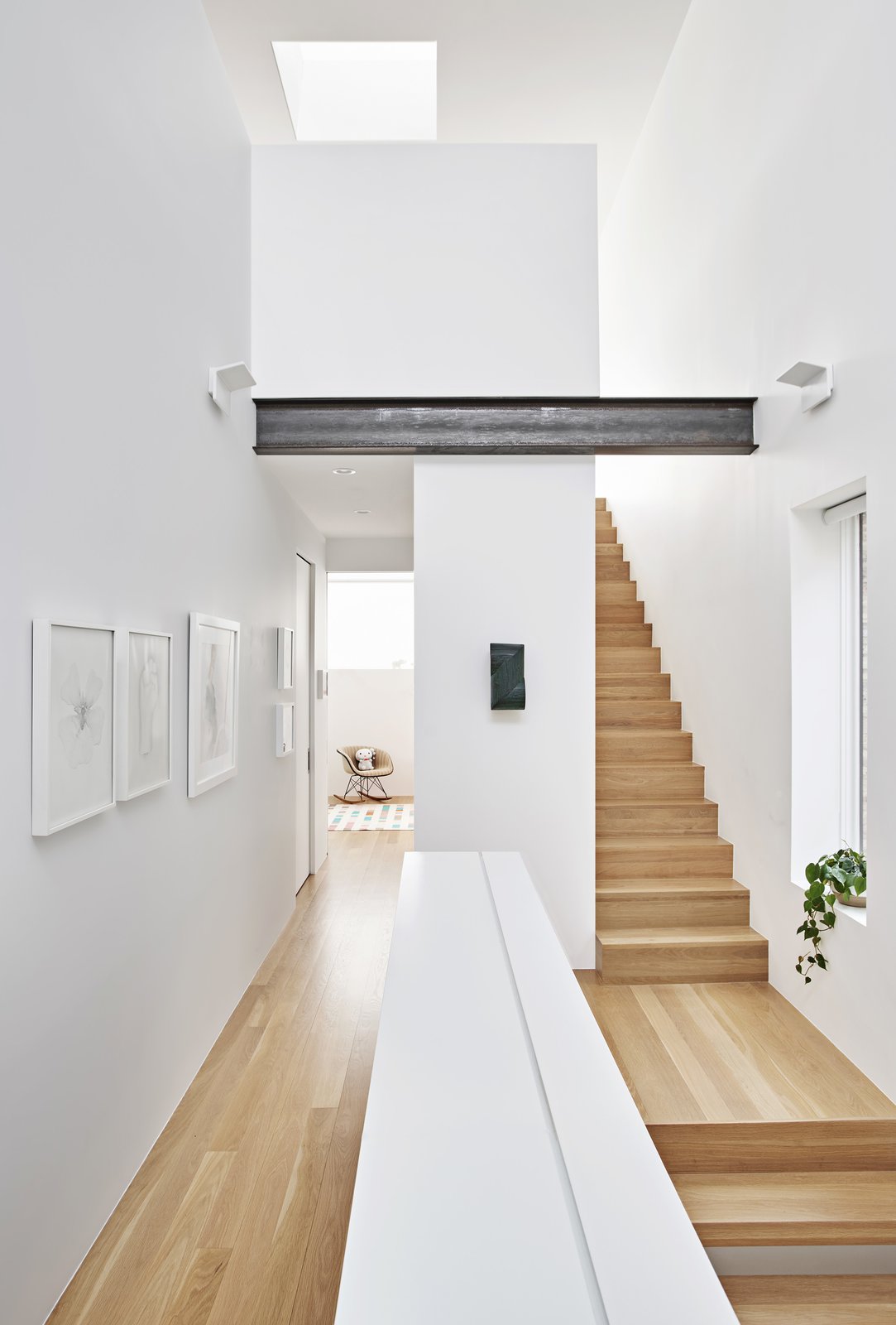 Photo 11 of 20 in Before & After: An Atrium-Like Staircase Fills This ...