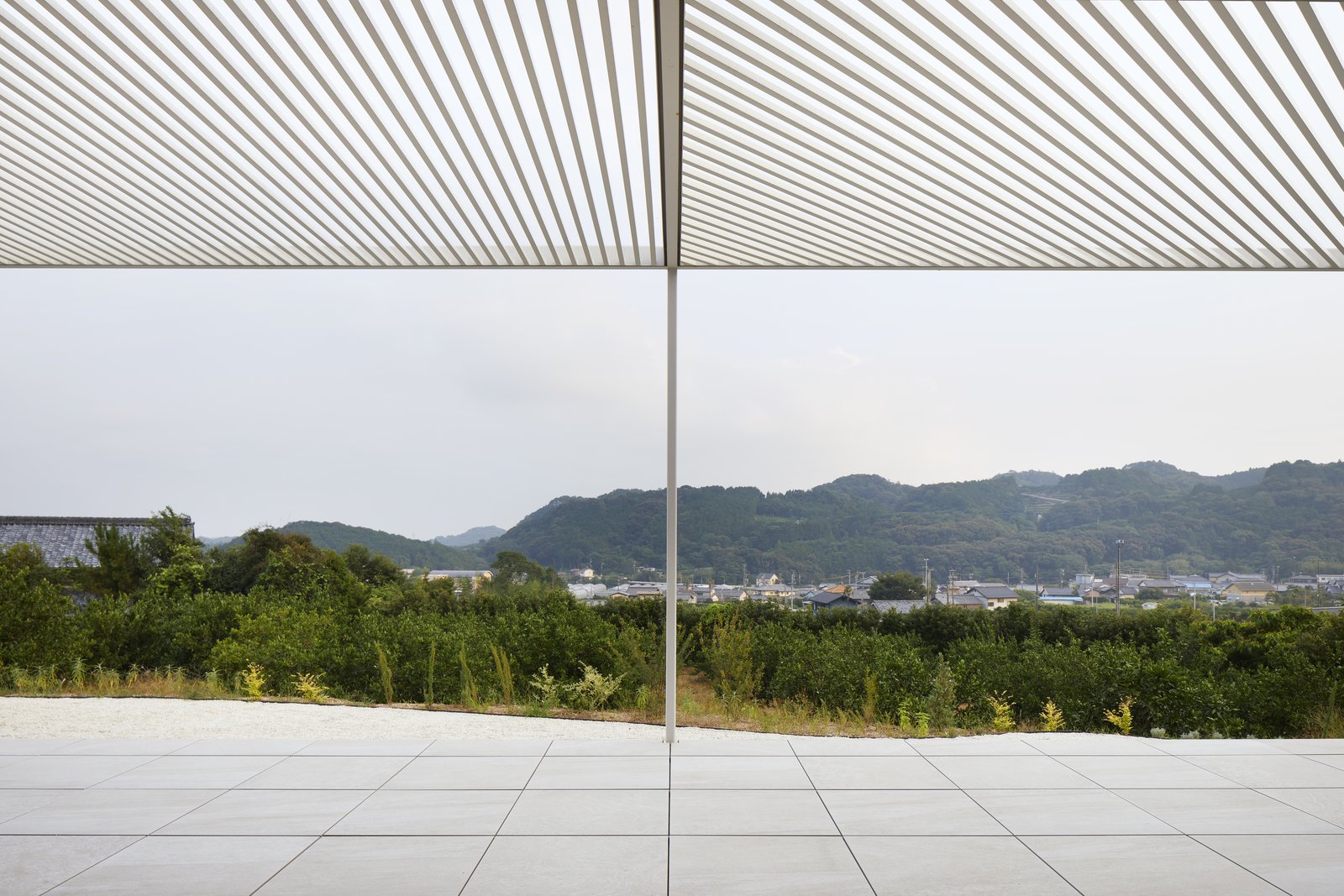 Photo 5 of 9 in A Shaded Veranda Wraps Around This Japanese Dwelling ...