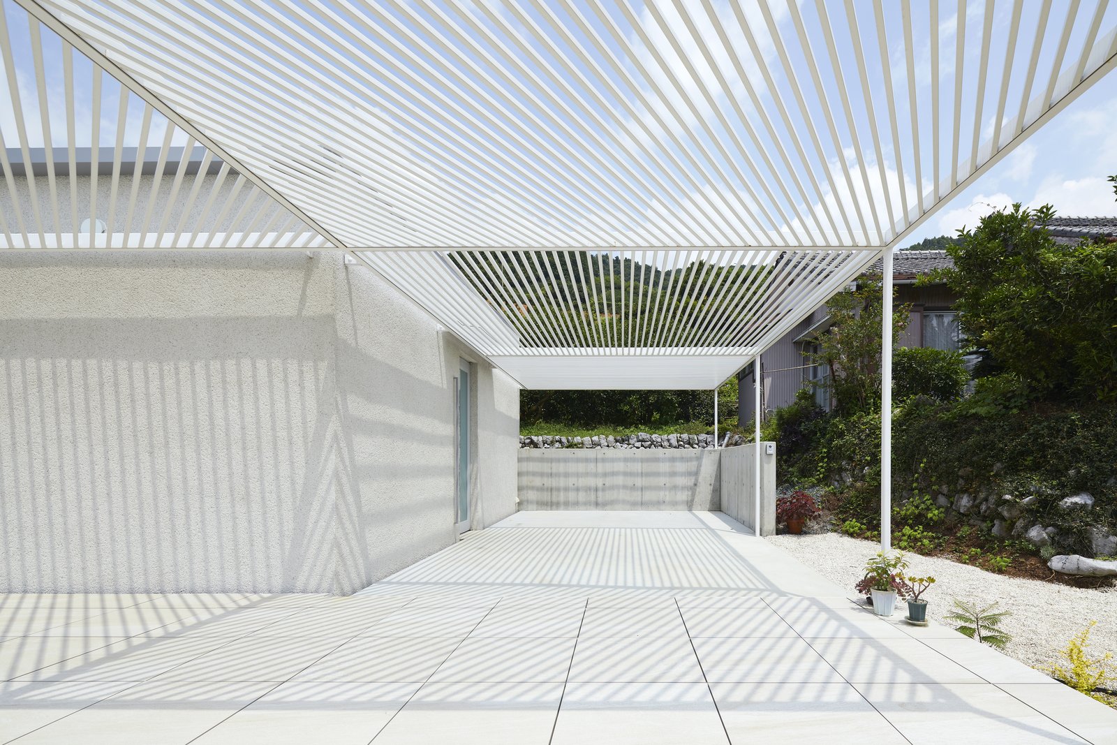 Photo 3 of 9 in A Shaded Veranda Wraps Around This Japanese Dwelling ...