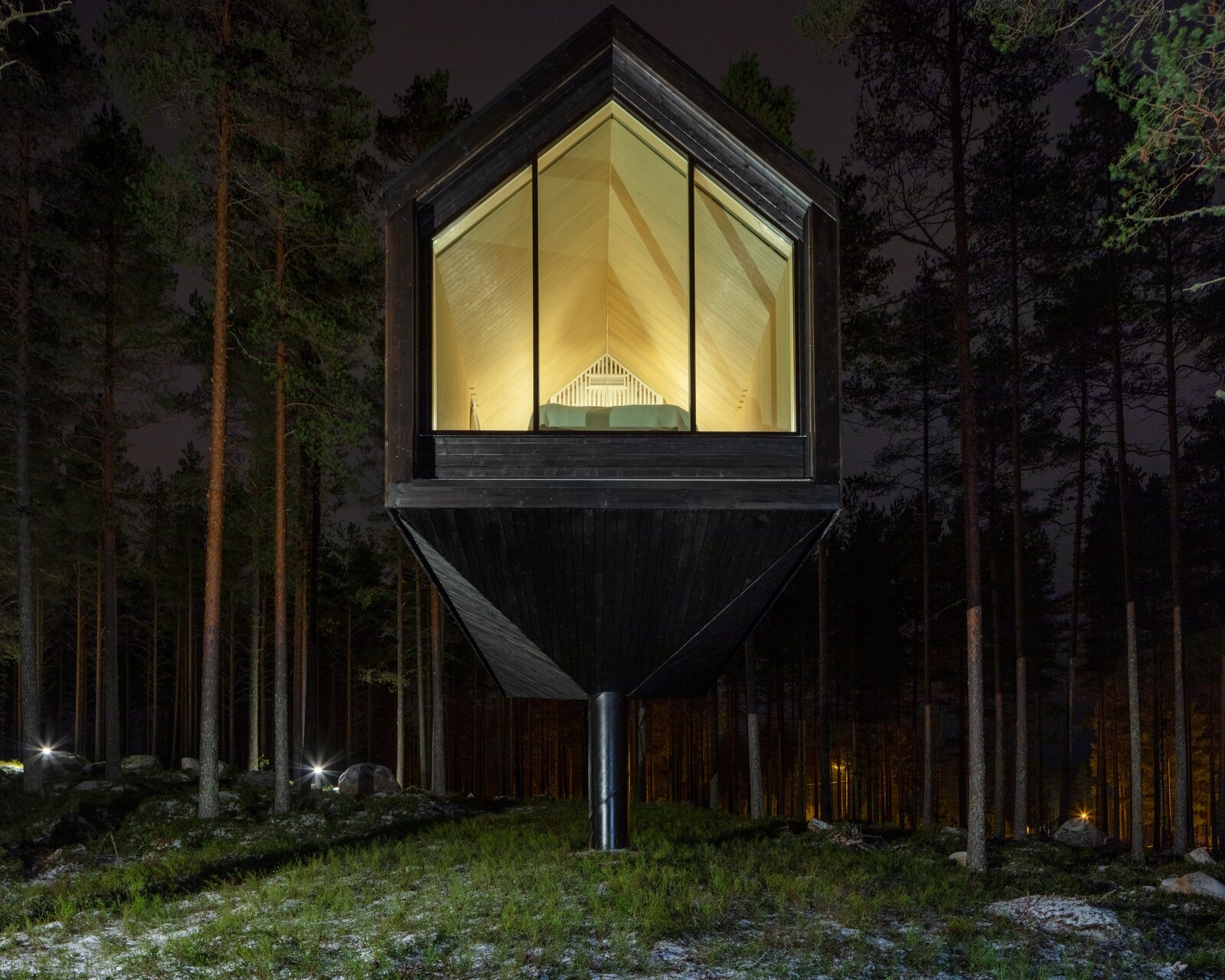 Photo 14 of 15 in This Cozy Cabin Stands Above the Forest Floor on a ...