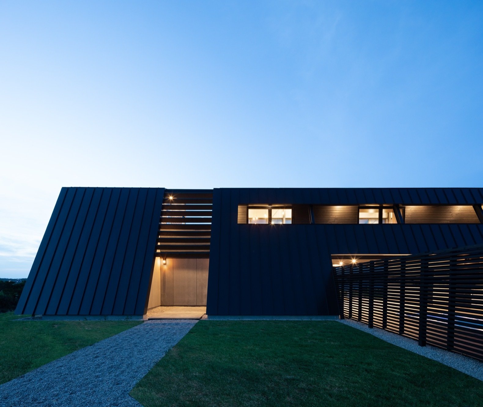 Photo 9 of 19 in A Folded Steel Roof Shields a Fortress-Like Abode in ...