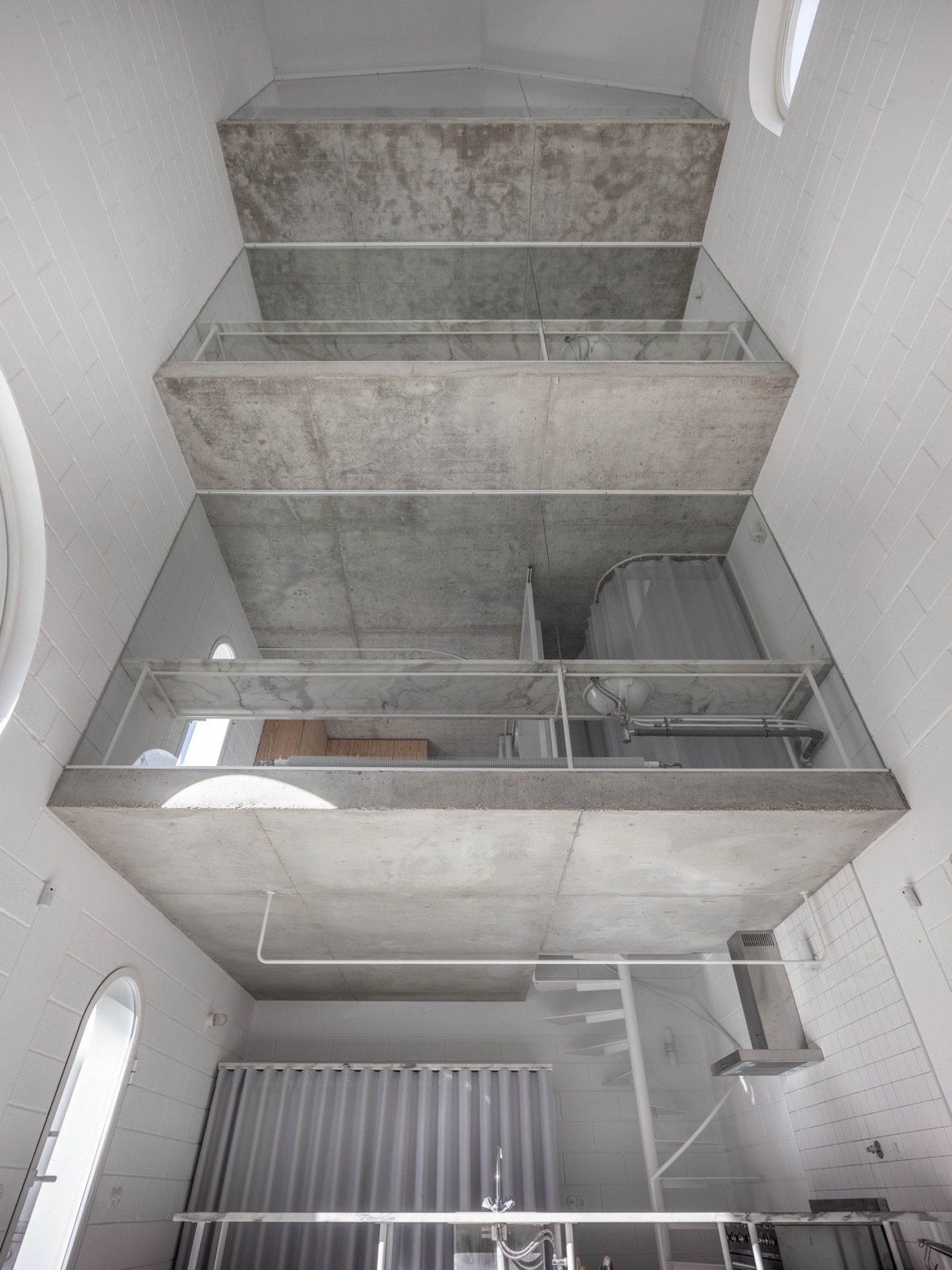 Photo 2 of 19 in A Tiny Lisbon Home Draws In Daylight With a Central ...