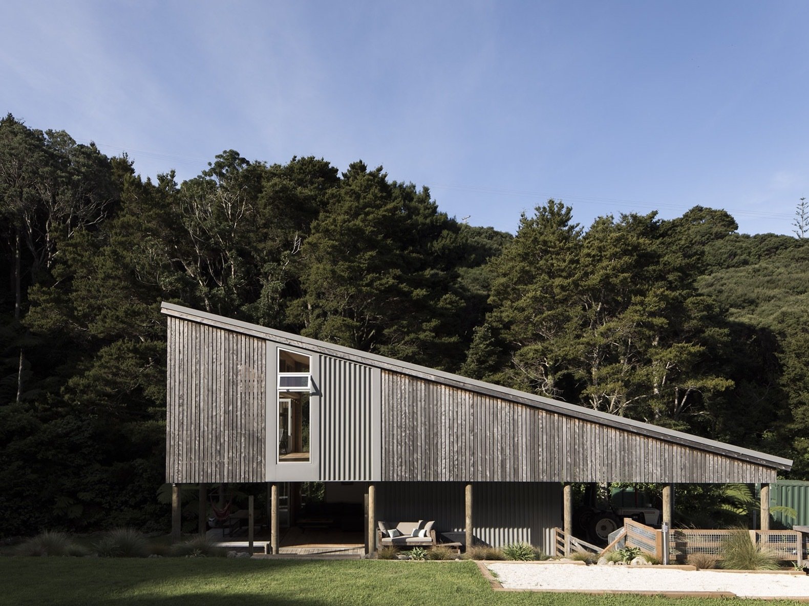 Photo 1 of 17 in A Wedge-Shaped Home Opens Up to the New Zealand Bush ...