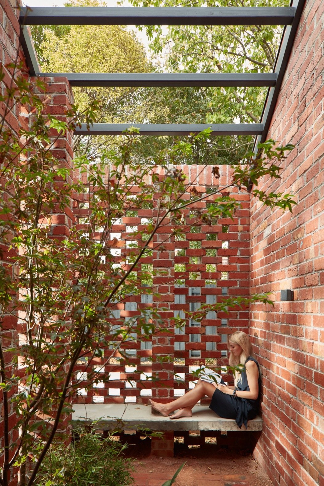 Photo 6 of 10 in Recycled Red Brick Wraps Two Affordable Rental Homes ...