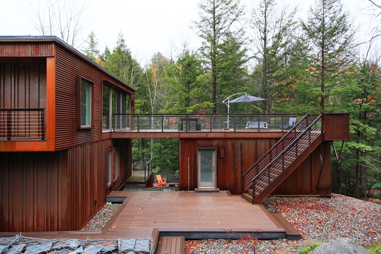 Photo 4 of 11 in Budget Breakdown: A Steel-Clad Prefab Blends Into a ...