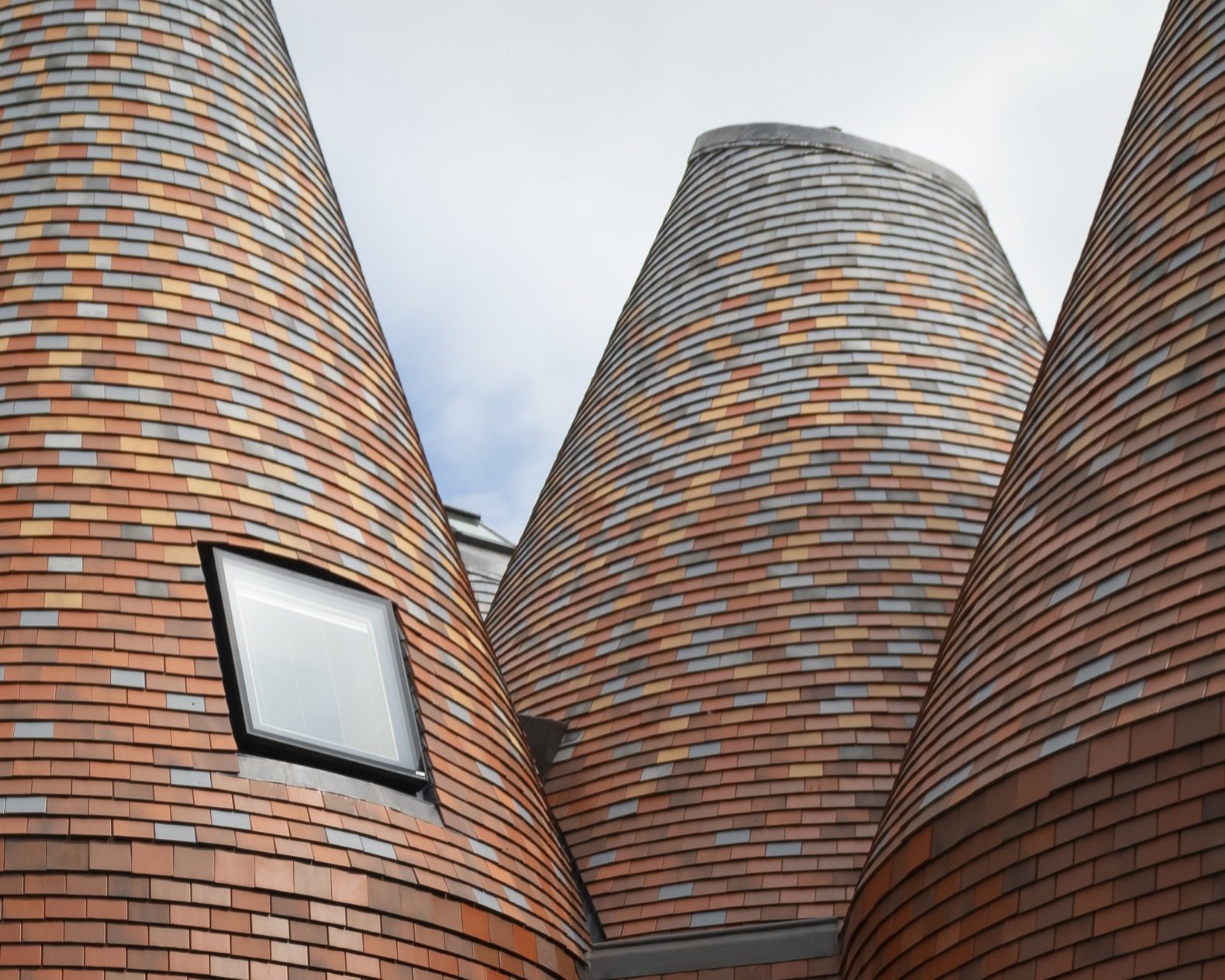 Photo 5 of 18 in Five Tile-Clad Towers Forge a Fantastical Home ...