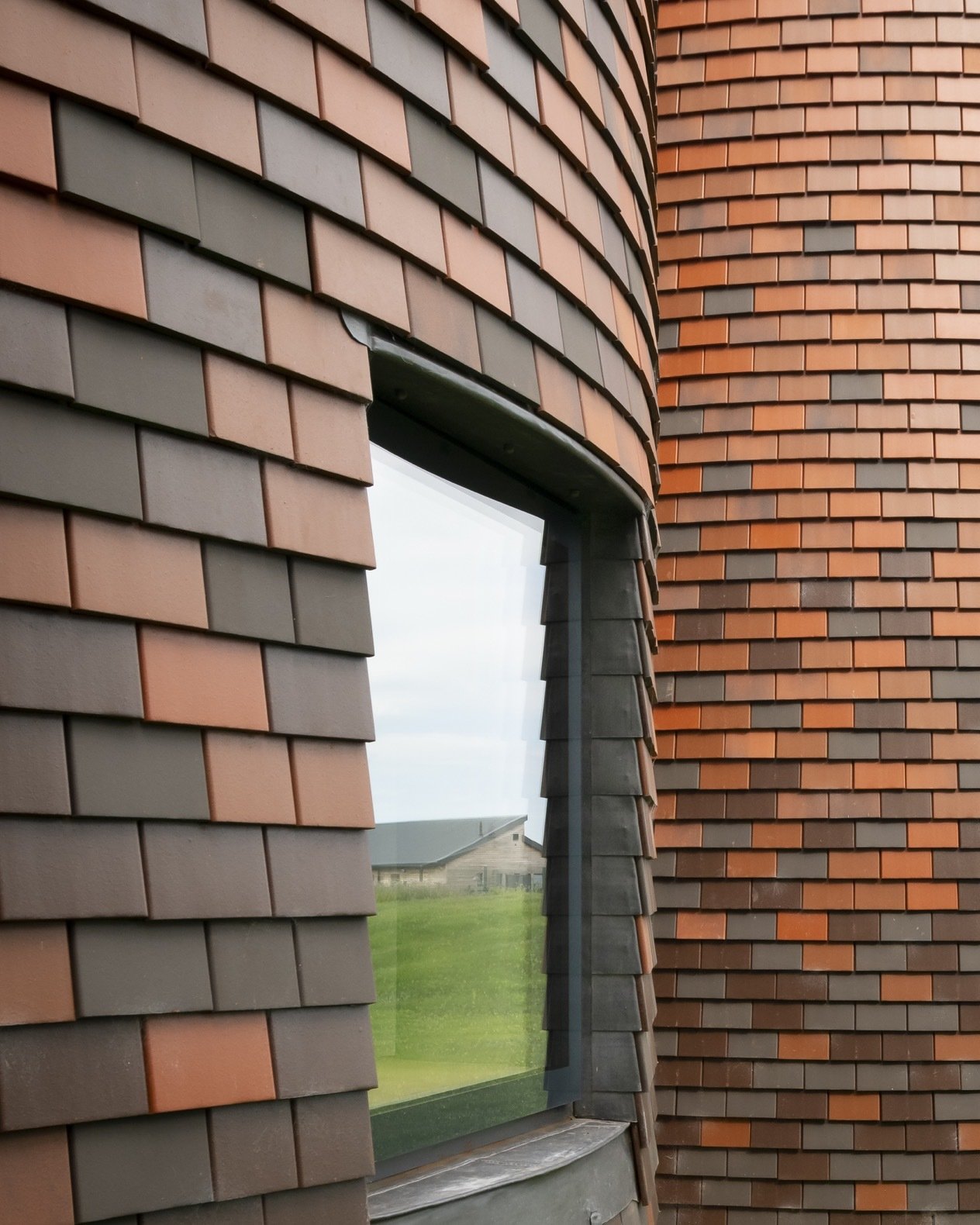 Photo 6 of 18 in Five Tile-Clad Towers Forge a Fantastical Home ...