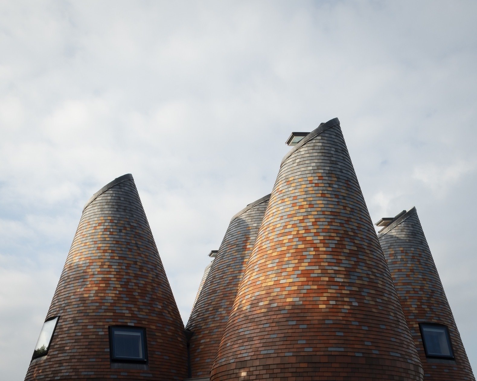 Photo 2 of 18 in Five Tile-Clad Towers Forge a Fantastical Home ...