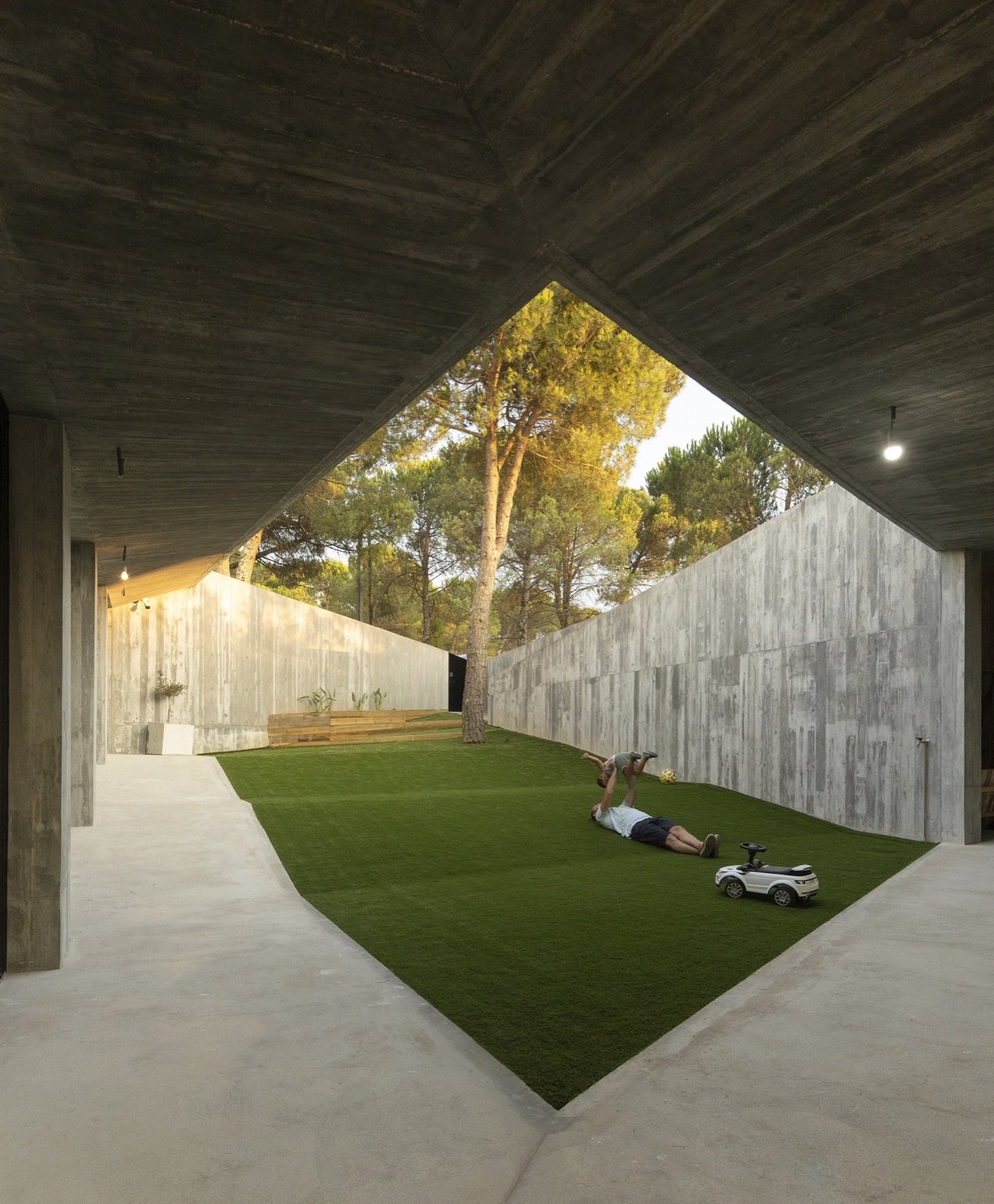 Photo 4 of 20 in A Jagged Concrete Home Emerges From Its Rocky ...