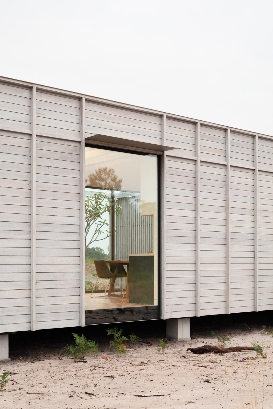 Photo 13 of 17 in An Off-Grid Prefab Home Slides Wide Open to the ...